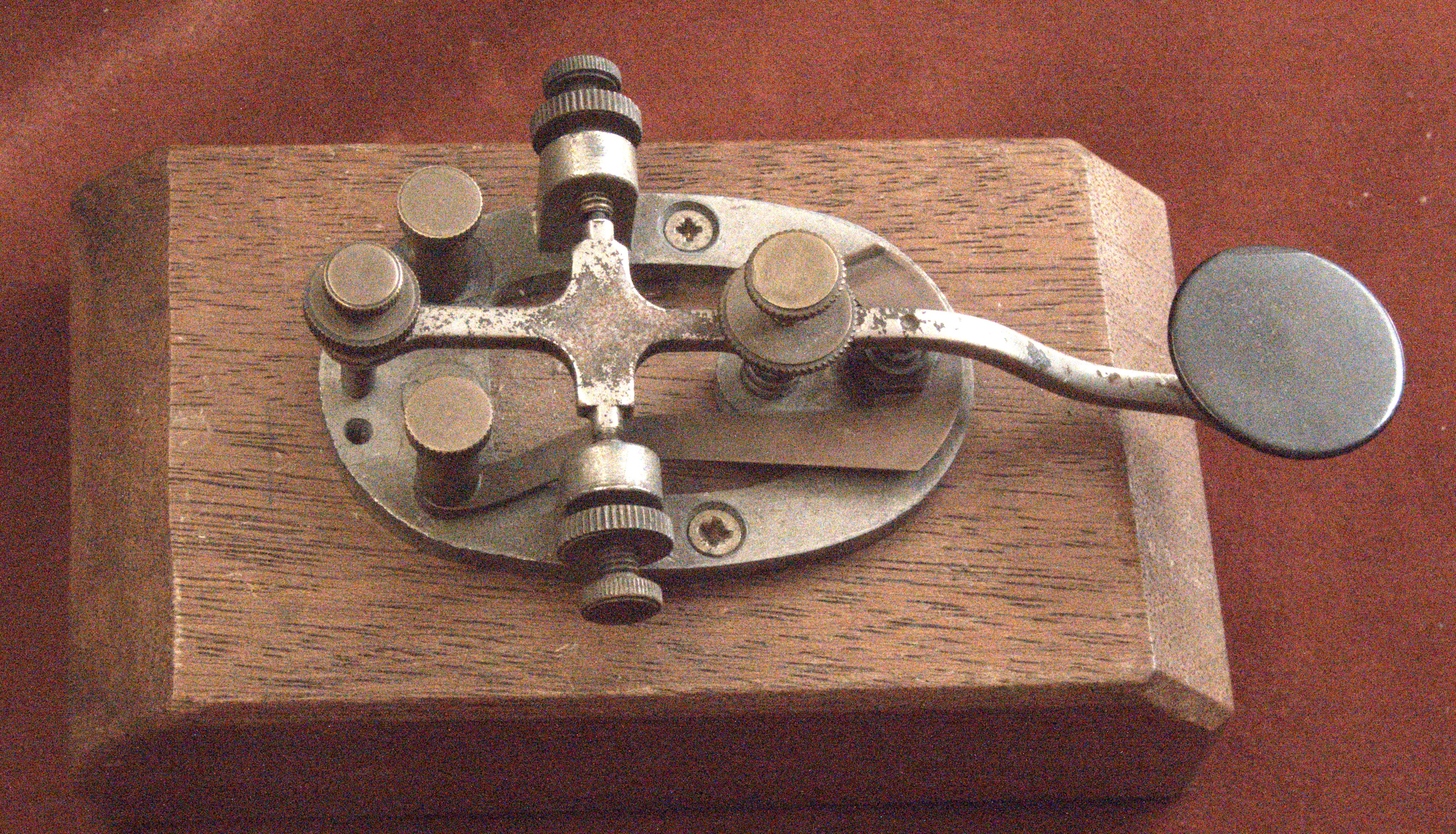 Telegraph Key - Speed-X Straight Key, mounted on a wooden plinth