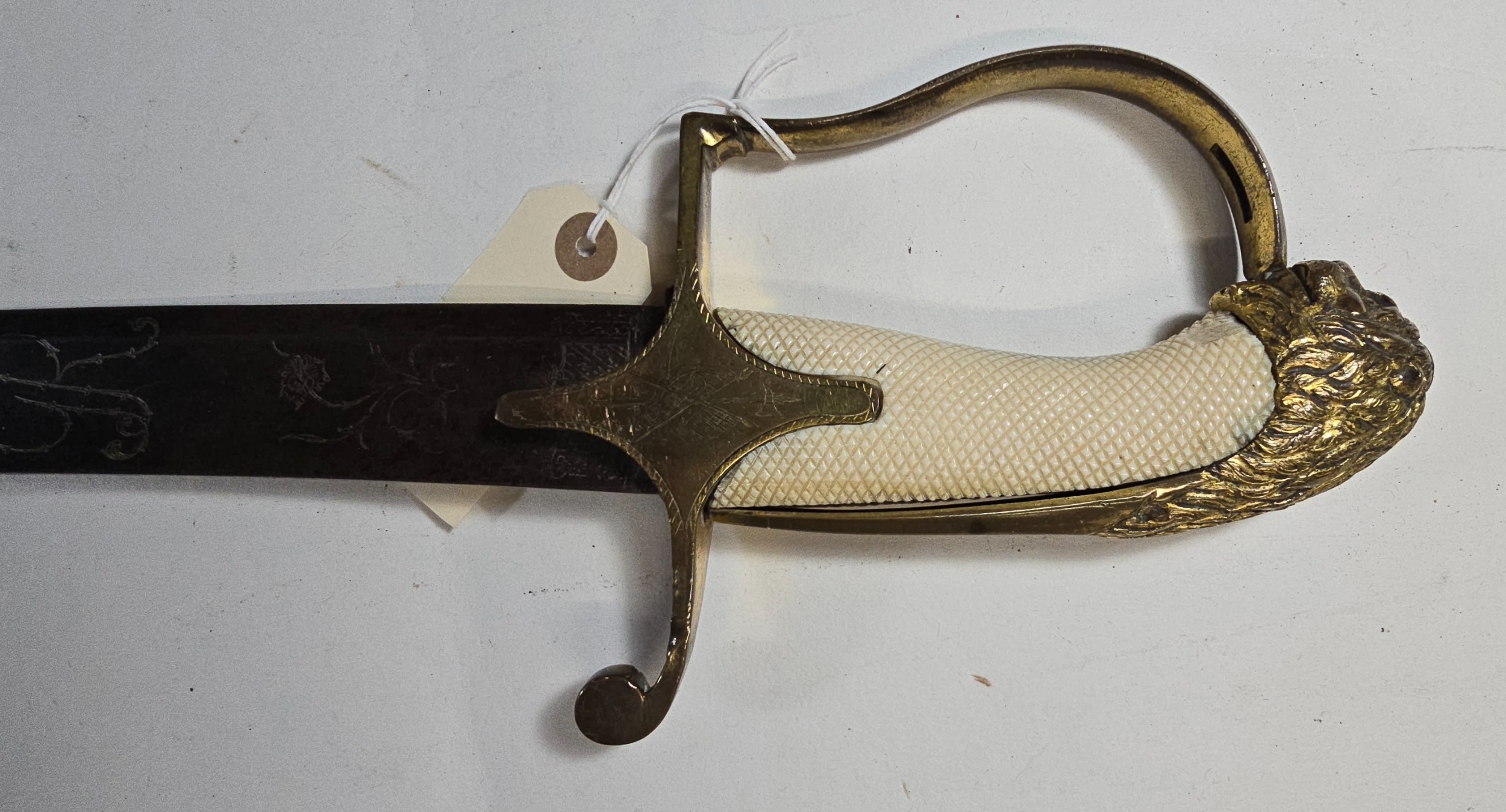 A Georgian Cavalry Officers Sword circa 1800, blade 32 1/2" etched with ...