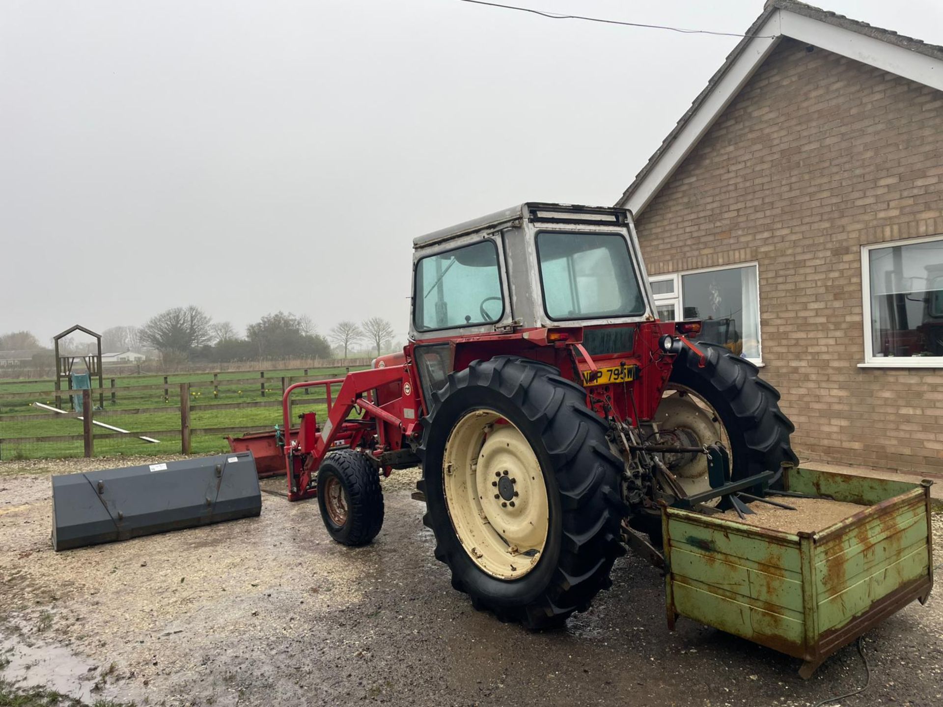 Massey Ferguson 575 with attachments: Euro 8 headstock, loader bucket ...
