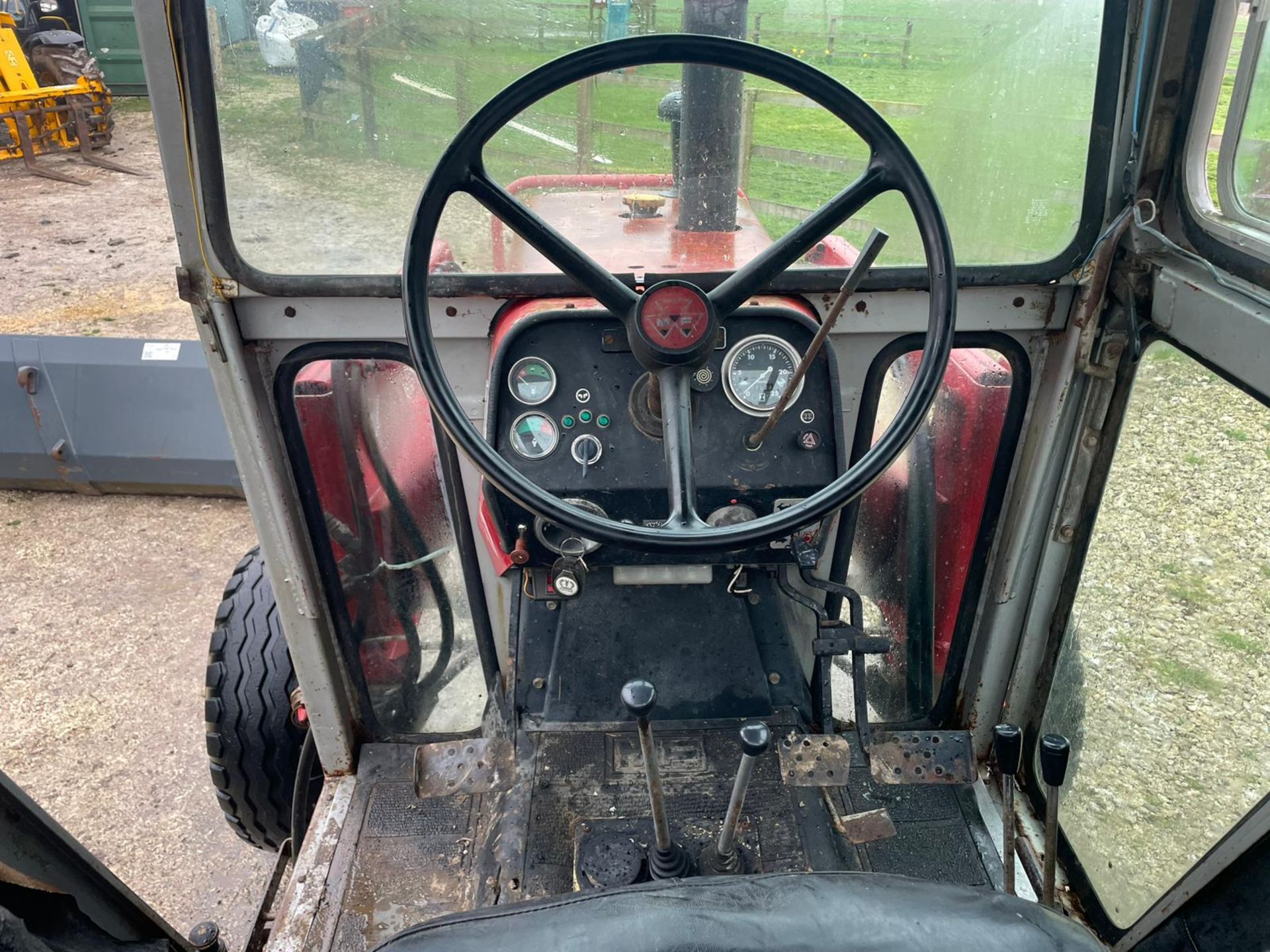 Massey Ferguson 575 with attachments: Euro 8 headstock, loader bucket ...