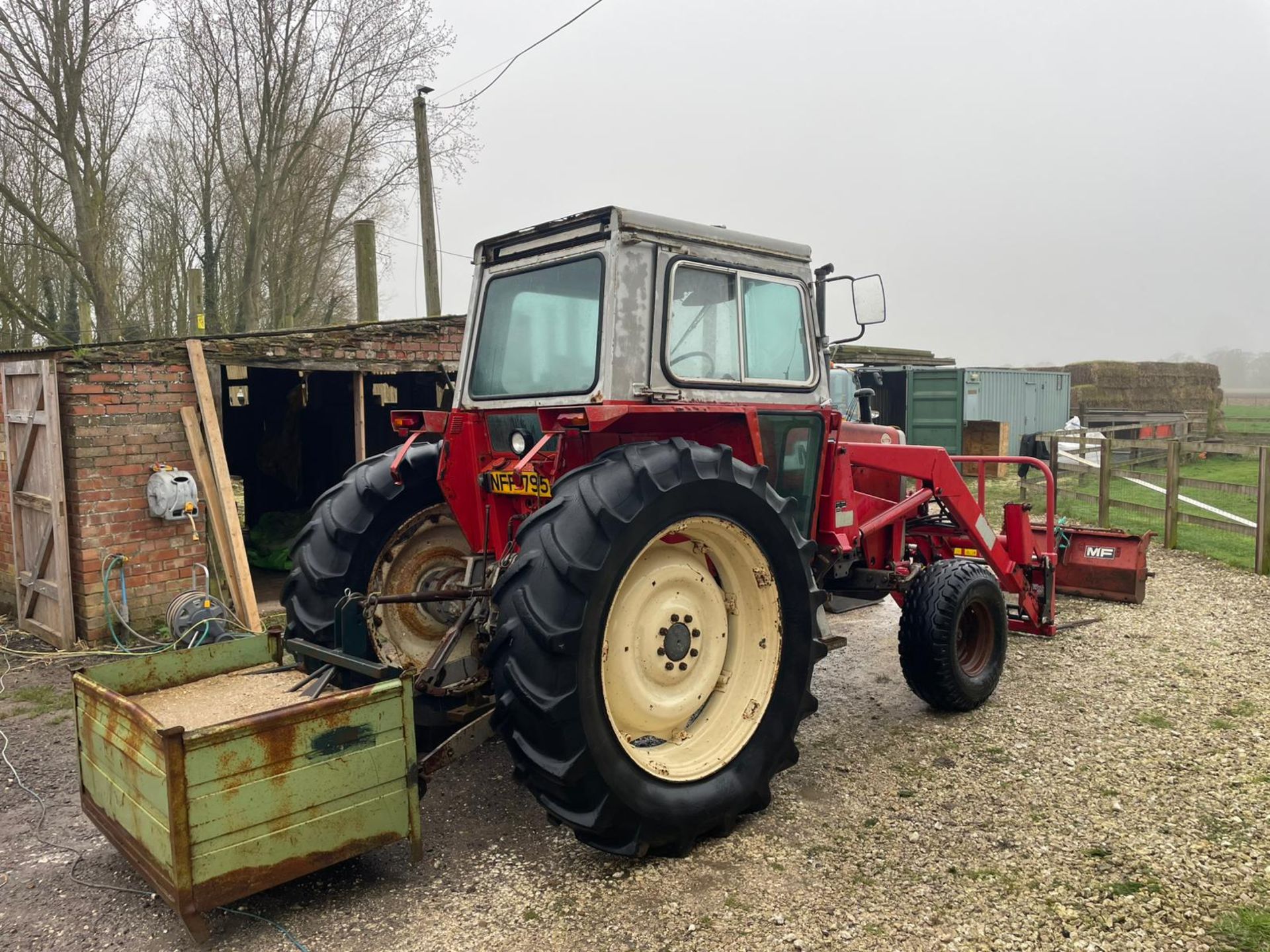 Massey Ferguson 575 with attachments: Euro 8 headstock, loader bucket ...