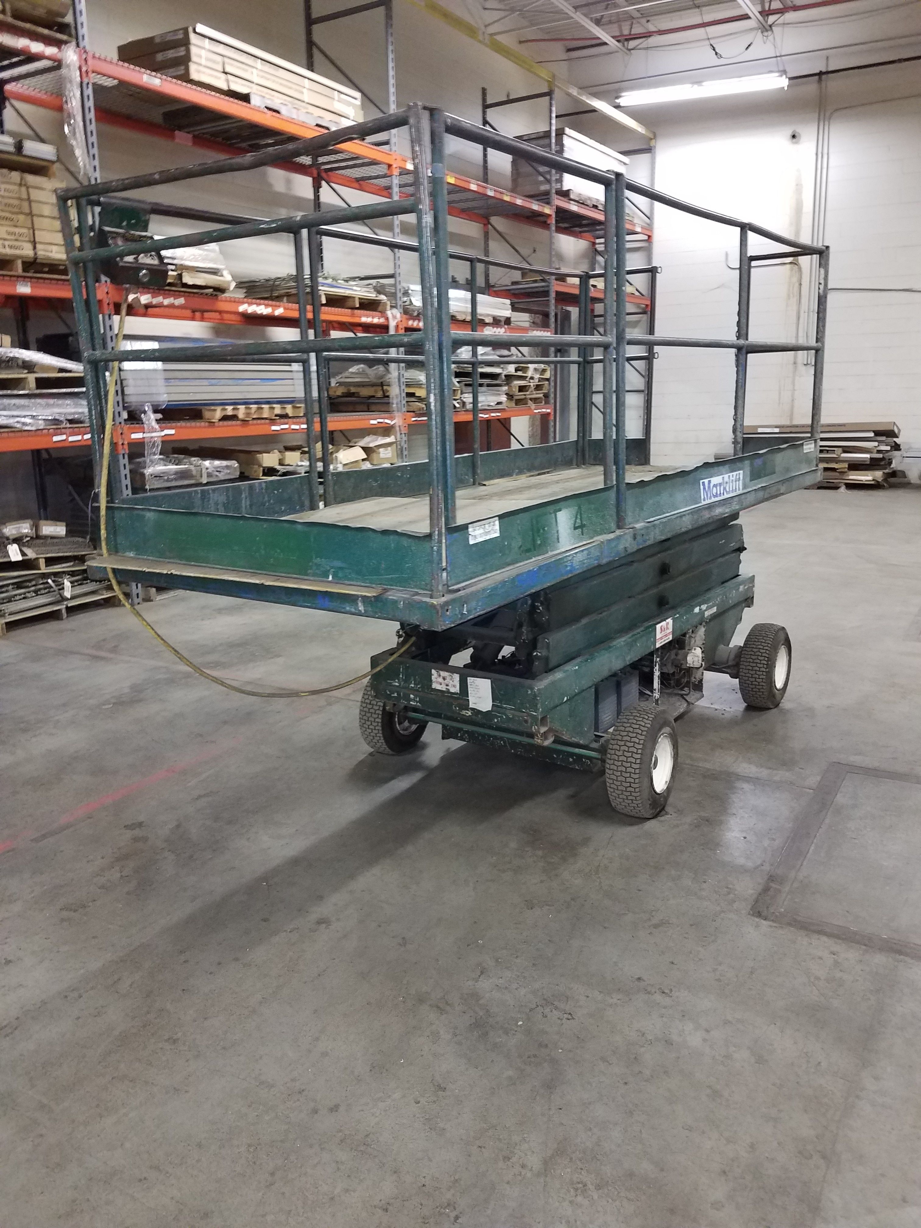 MARKLIFT ELECTRIC SCISSOR LIFT, 54" WIDE X 134" LONG WORK PLATFORM, 168 ...