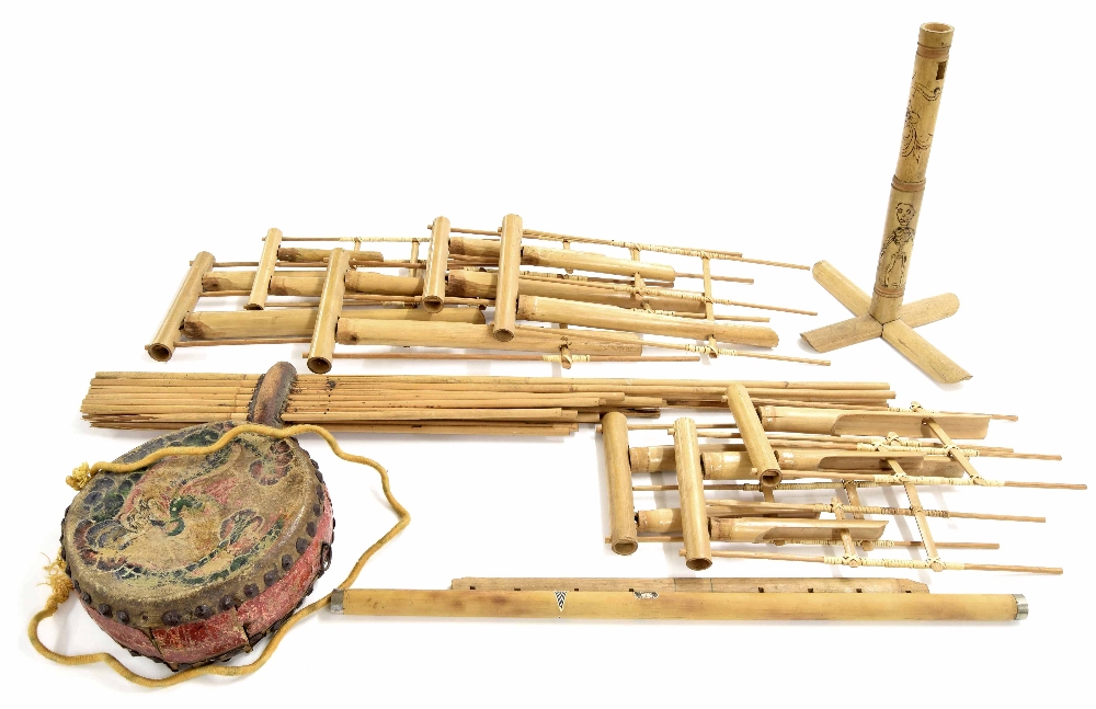Group of Asian instruments, a khene (mouth organ), Laotian or northern ...