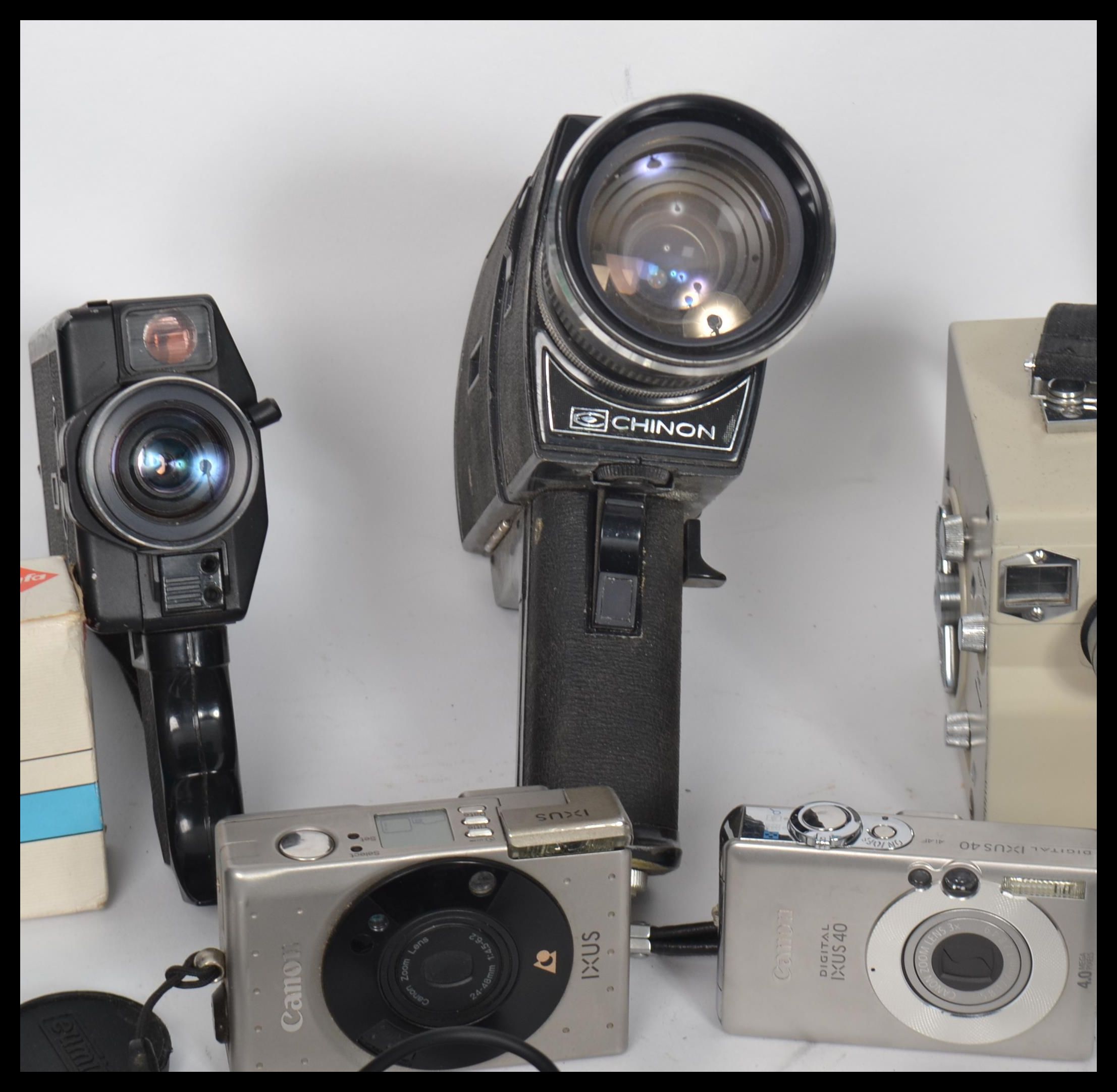 A good collection of vintage and retro 20th century cameras to include ...