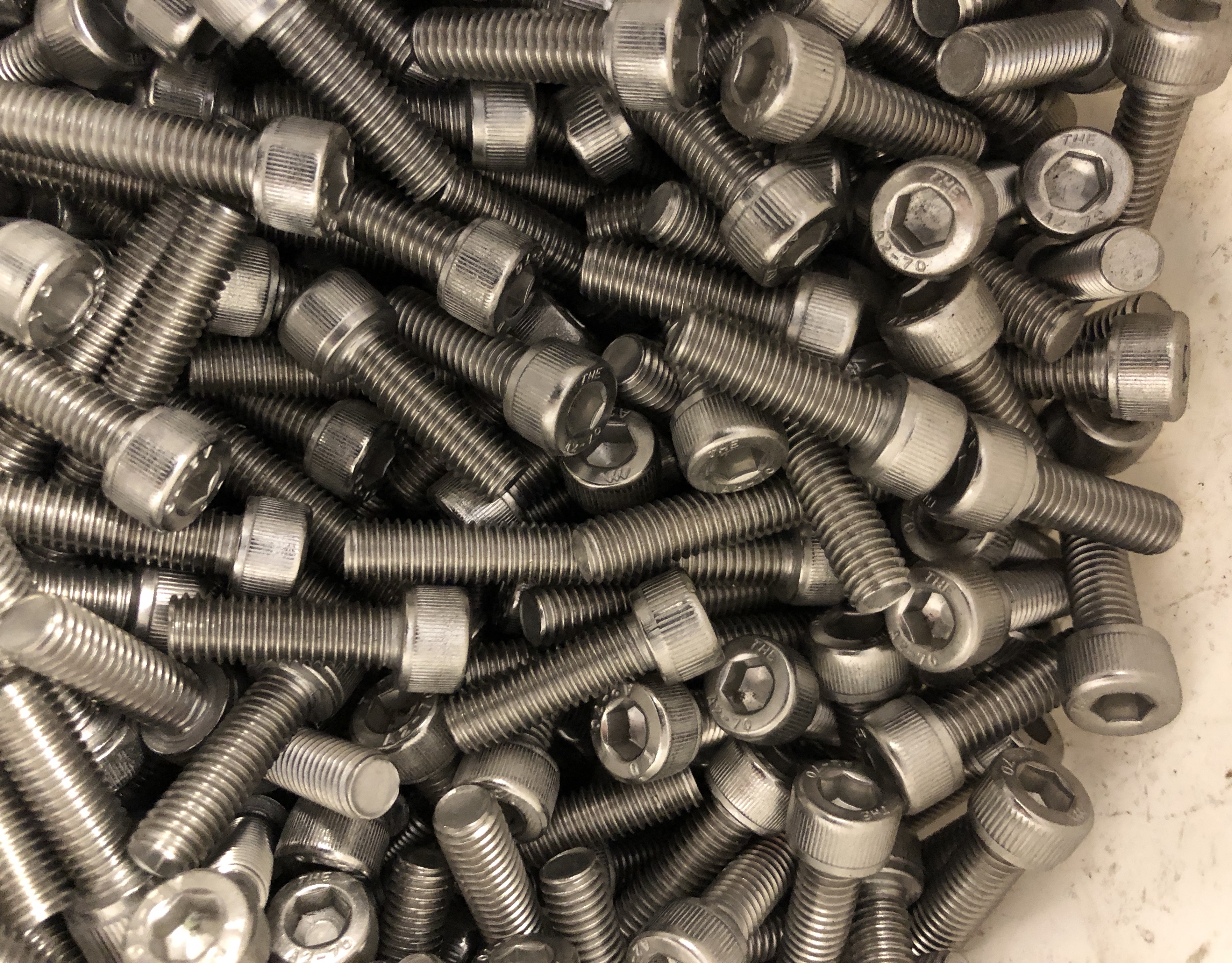 BUCKET FULL OF VERY EXPENSIVE SCREWS