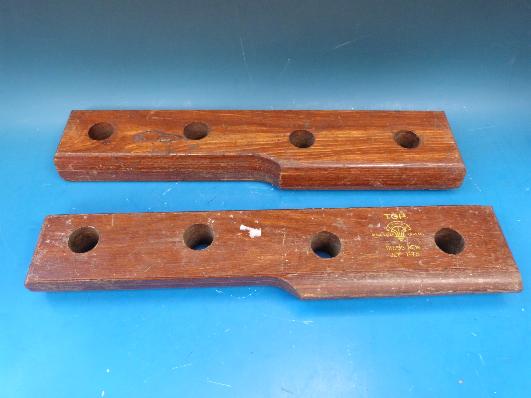 A pair of Permali Gloucester wooden railway fishplates (dated July 1975)