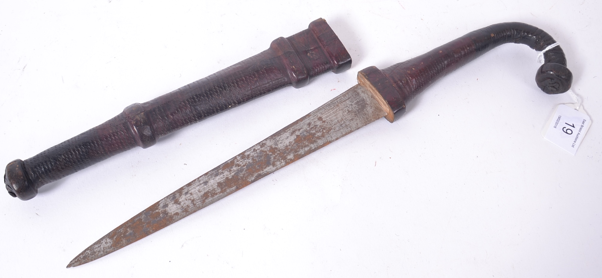 A vintage Indian ceremonial dagger knife, with a carved handle
