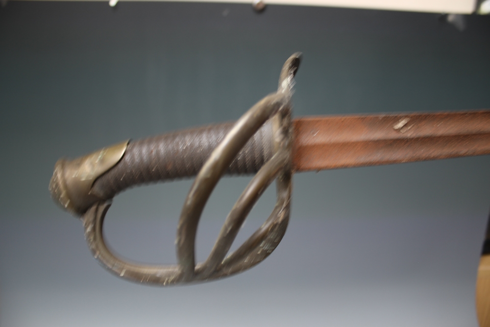 AN ANTIQUE CAVALRY SWORD, having single edged straight double fullered ...