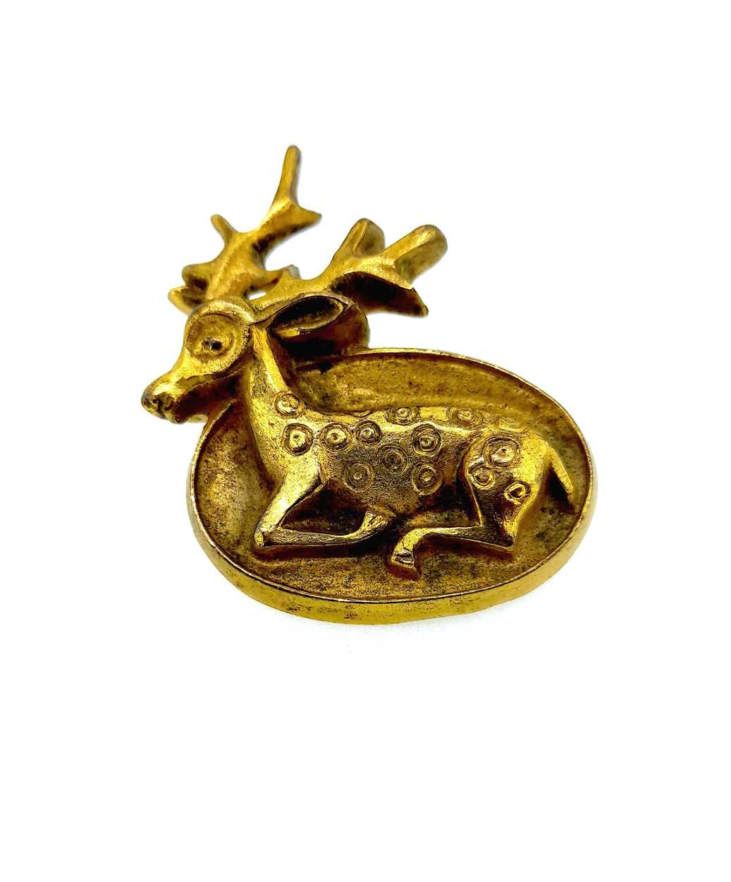 Paule Ingrand - a mid 20th century signed and gilded bronze brooch of a ...