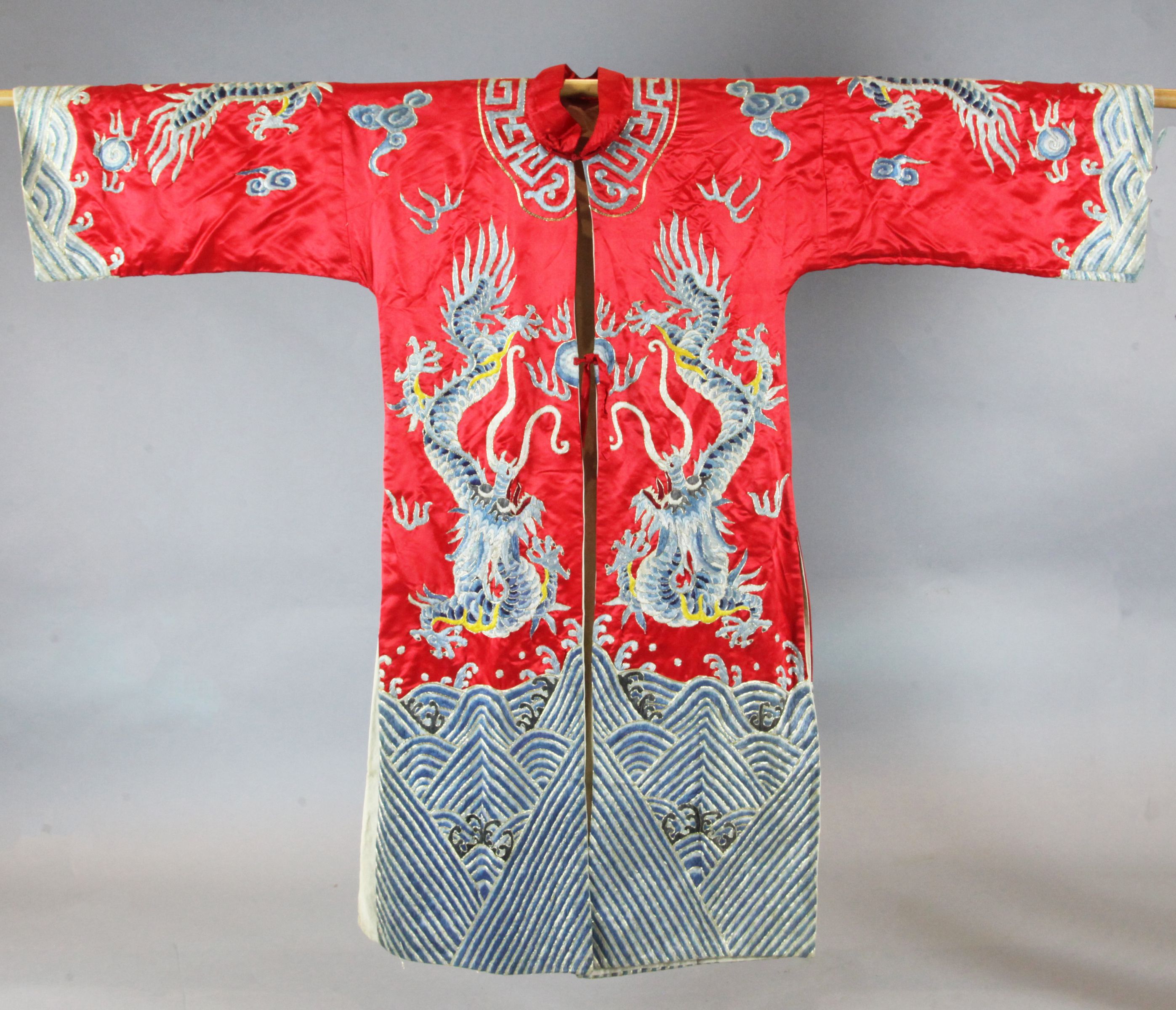 A Chinese embroidered silk 'dragon' robe, woven in metal thread and ...