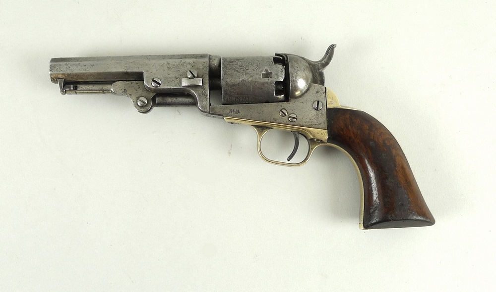 A Colt pocket revolver, 31 caliber, with hexagon barrel, flared grip ...