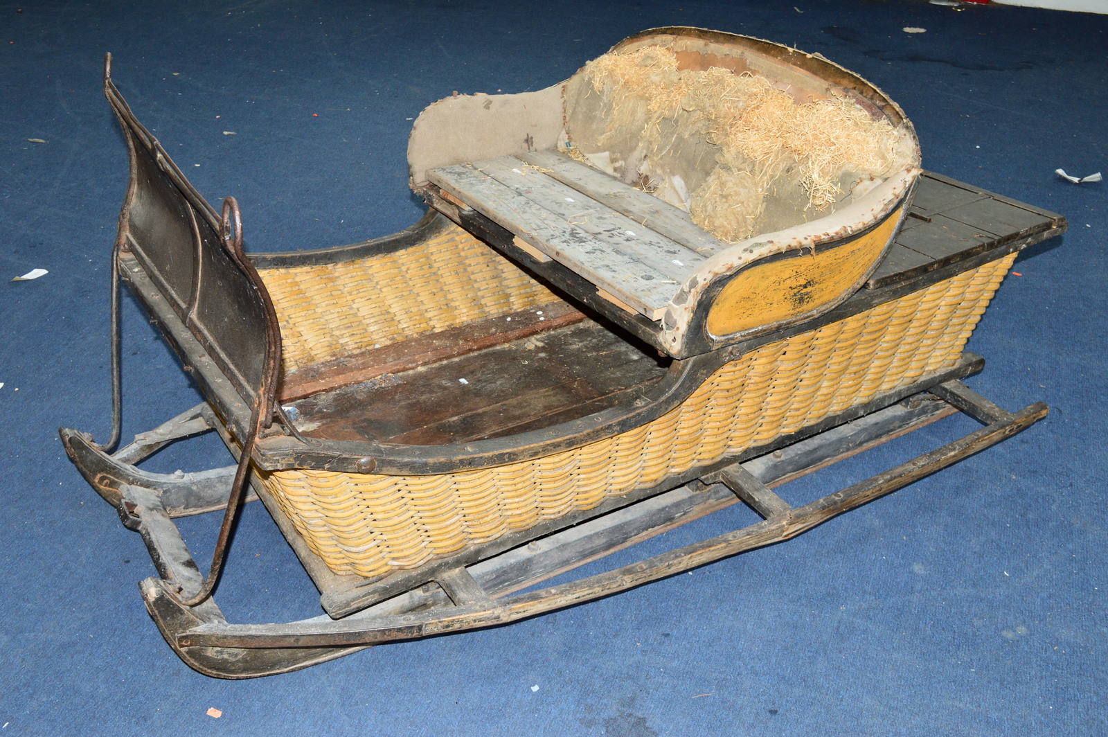 A 19TH CENTURY HORSE DRAWN SLEIGH, in need of restoration, fitted with ...