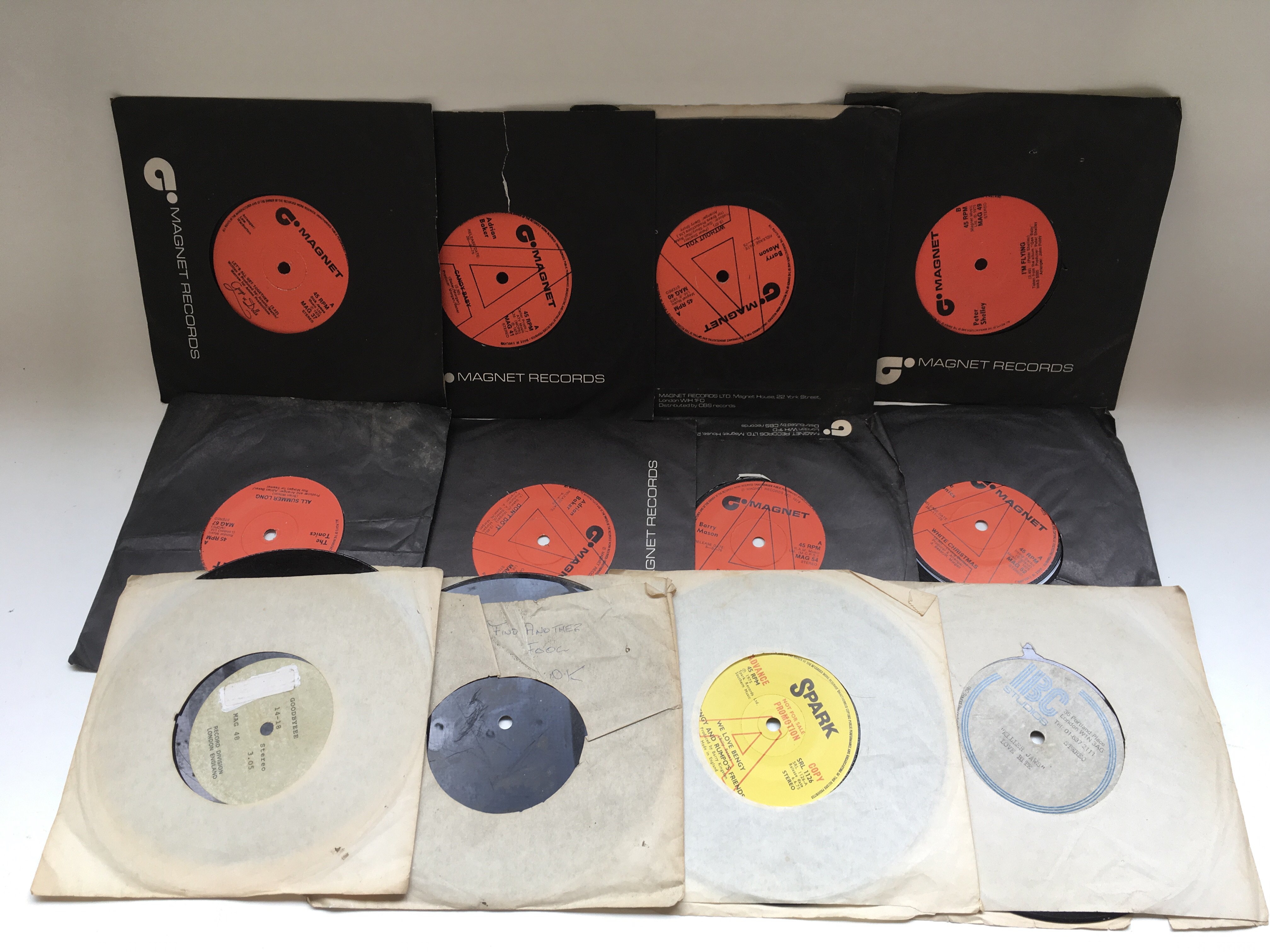 A small collection of 7 inch singles by various artists including some ...
