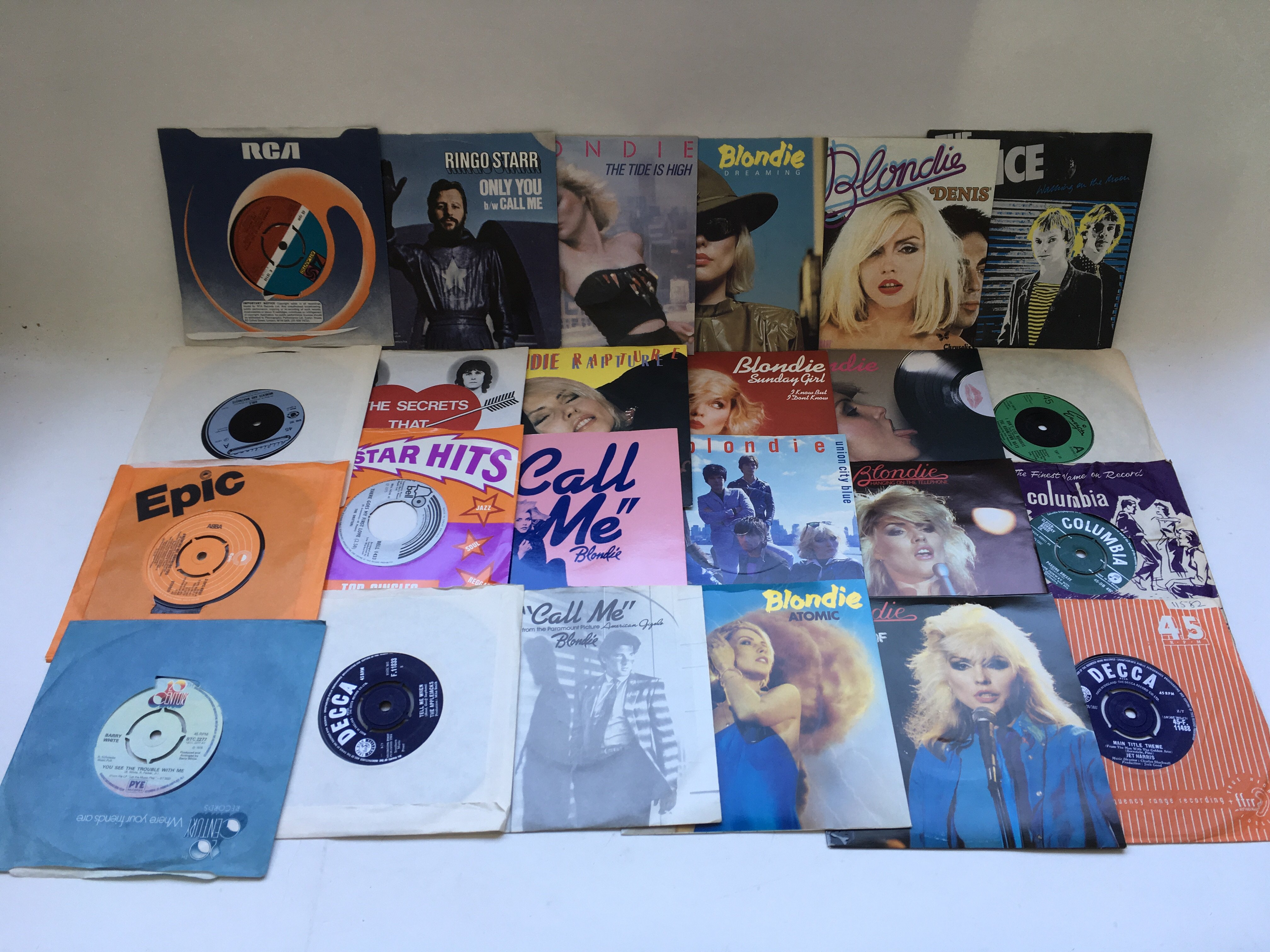 A collection of 7 inch singles and EPs by various artists including The ...