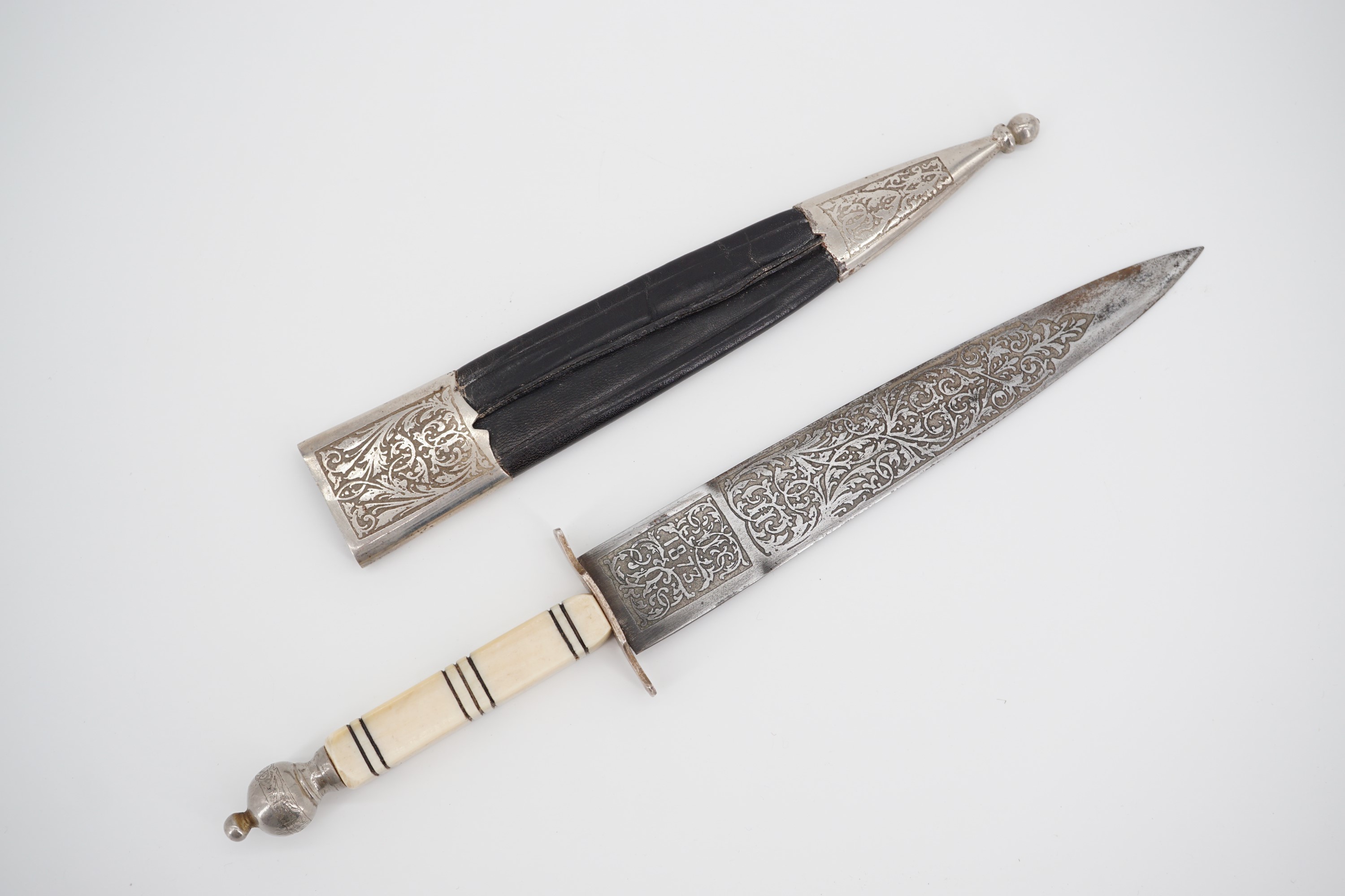 A Spanish hunting or dress knife, the blade etching incorporating the ...