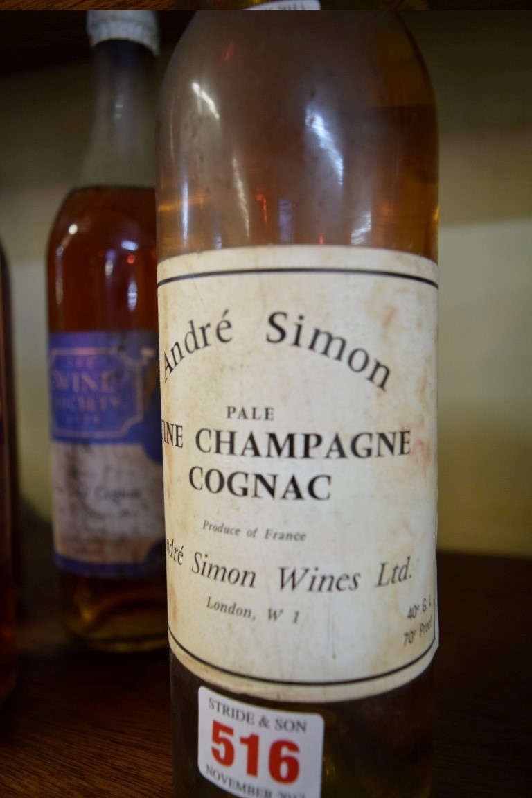 A 24 fl.oz. bottle of Andre Simon fine champagne cognac, 1960s bottling.