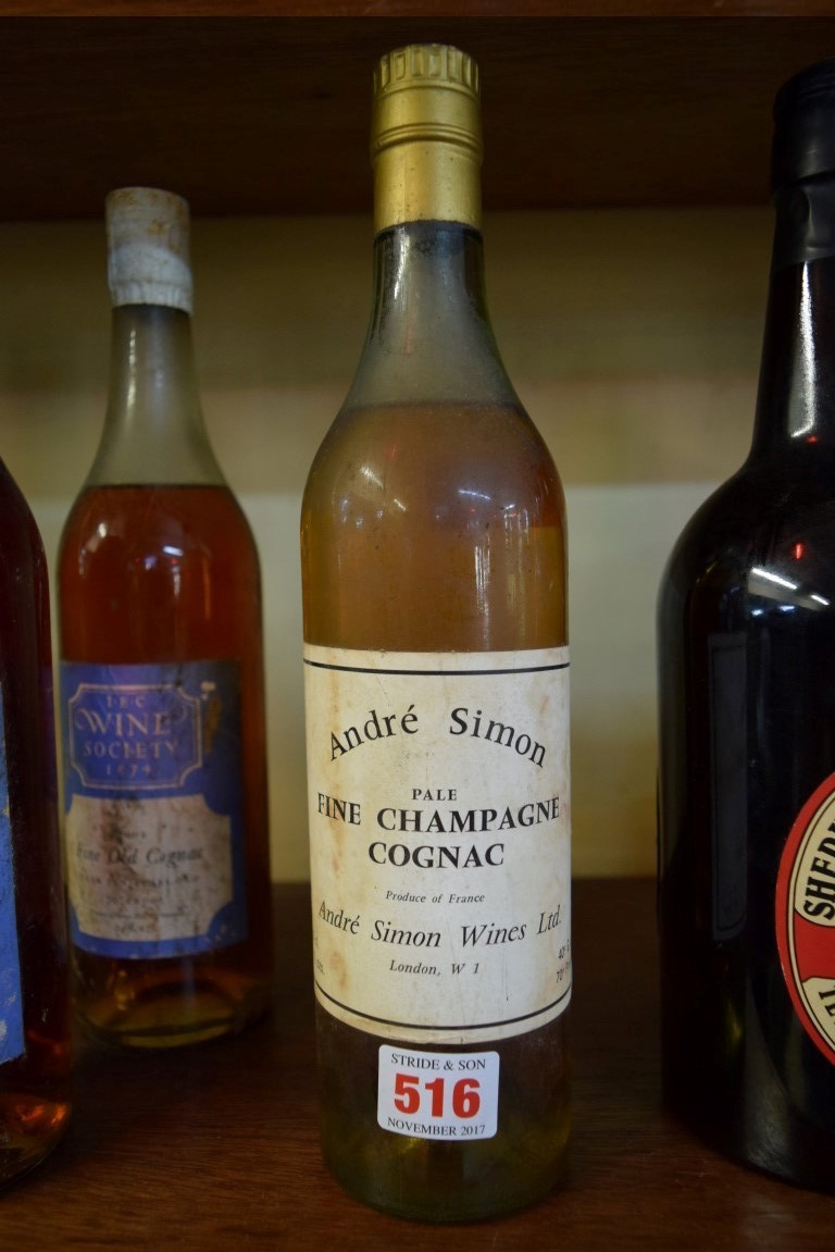 A 24 fl.oz. bottle of Andre Simon fine champagne cognac, 1960s bottling.