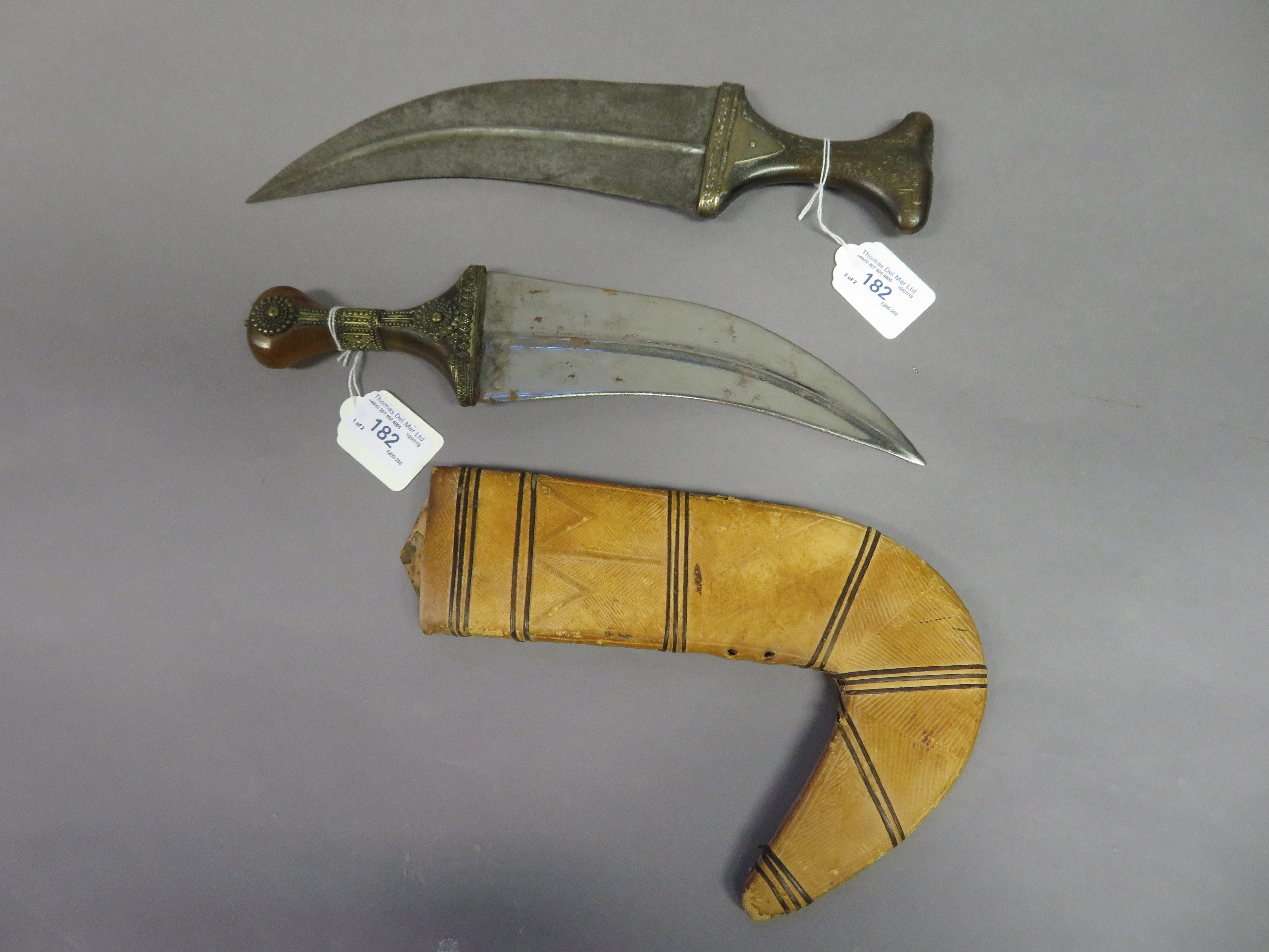 TWO ARAB DAGGERS (JAMBIYA), LATE 19TH/EARLY 20TH CENTURY each with ...