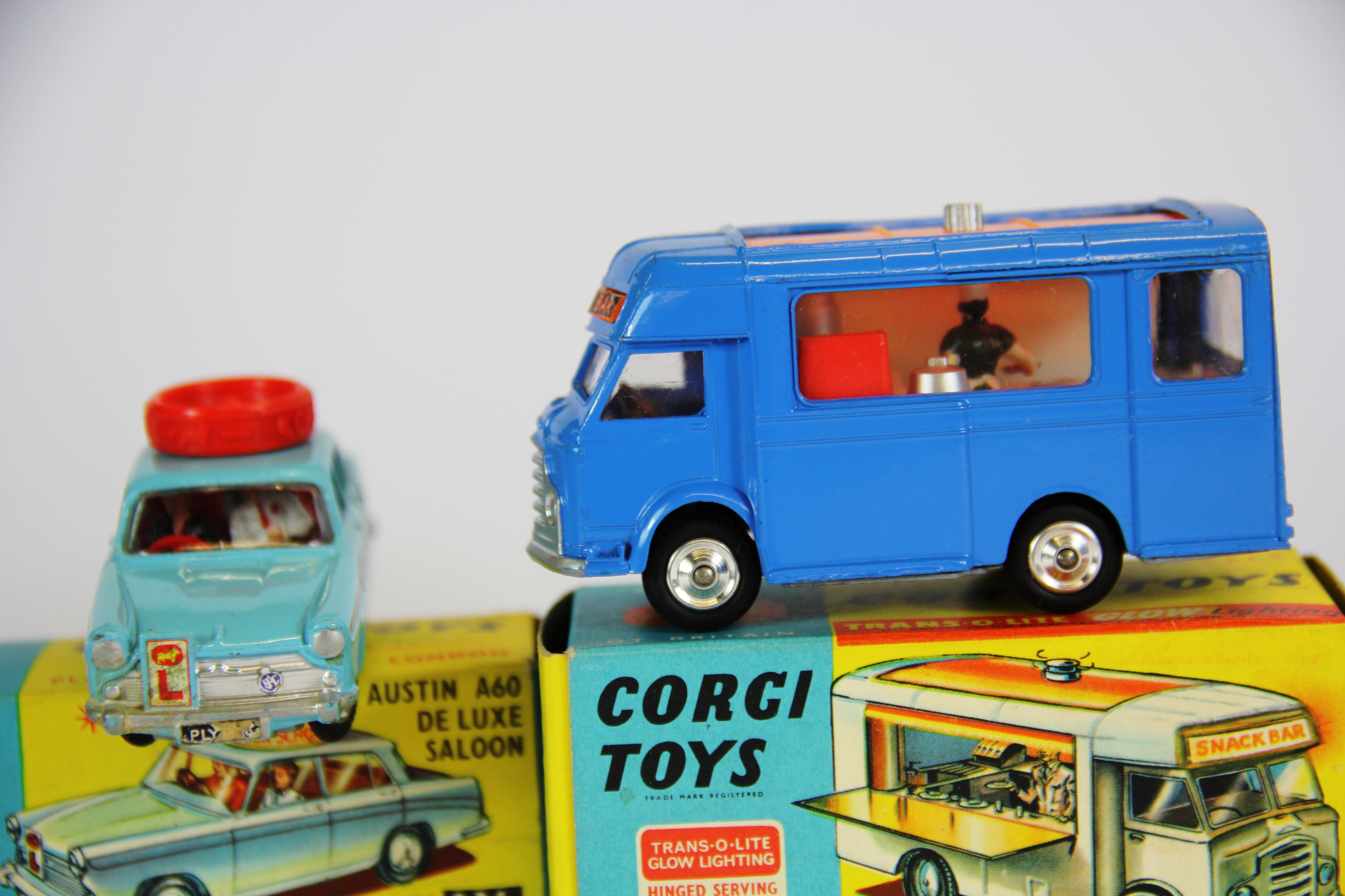 Two boxed vintage Corgi die cast toy vehicles 236 and 471.