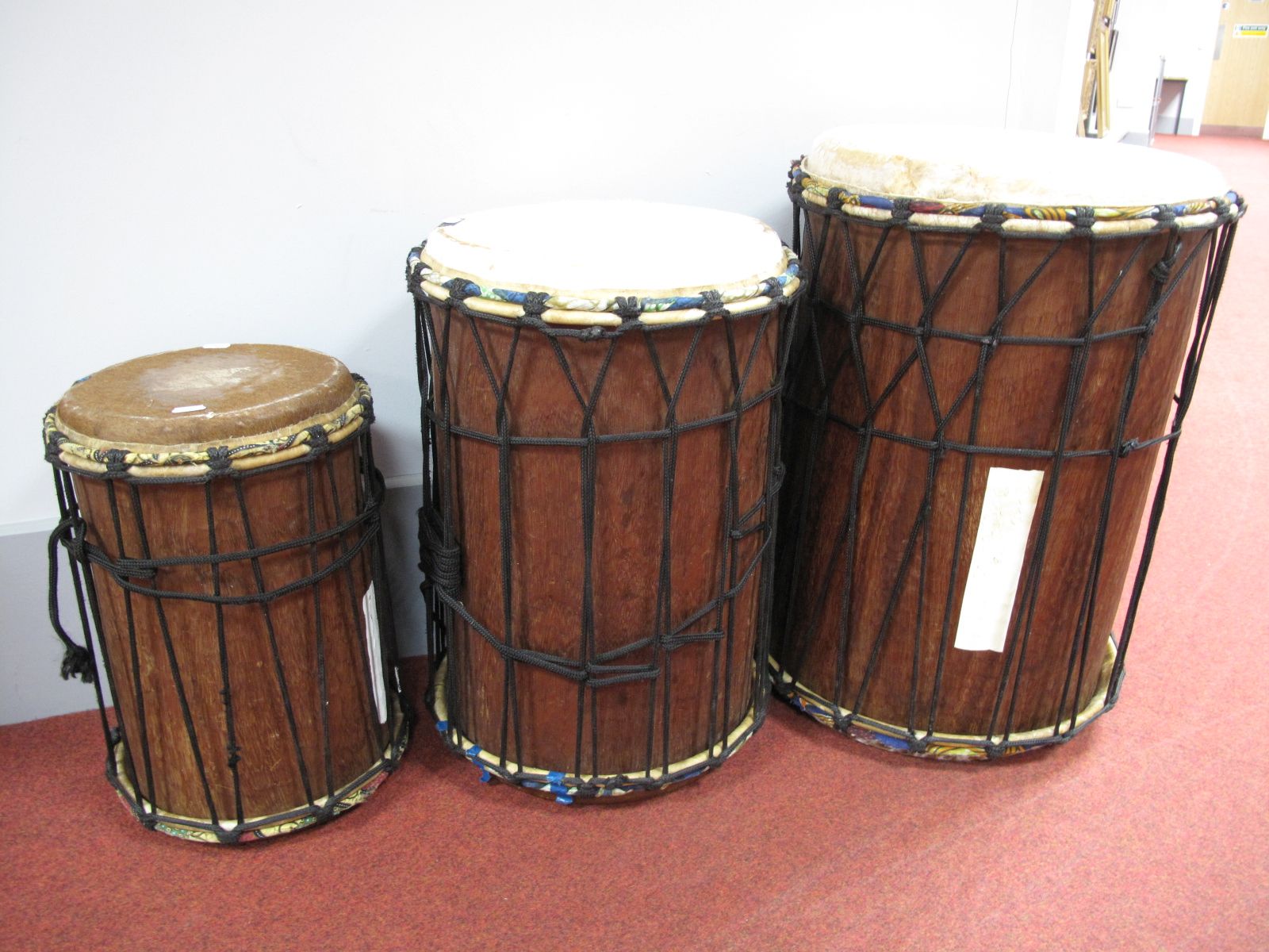 Three African Doum Doum (Dum Dum) Drums, all graduating in size (60, 52 ...
