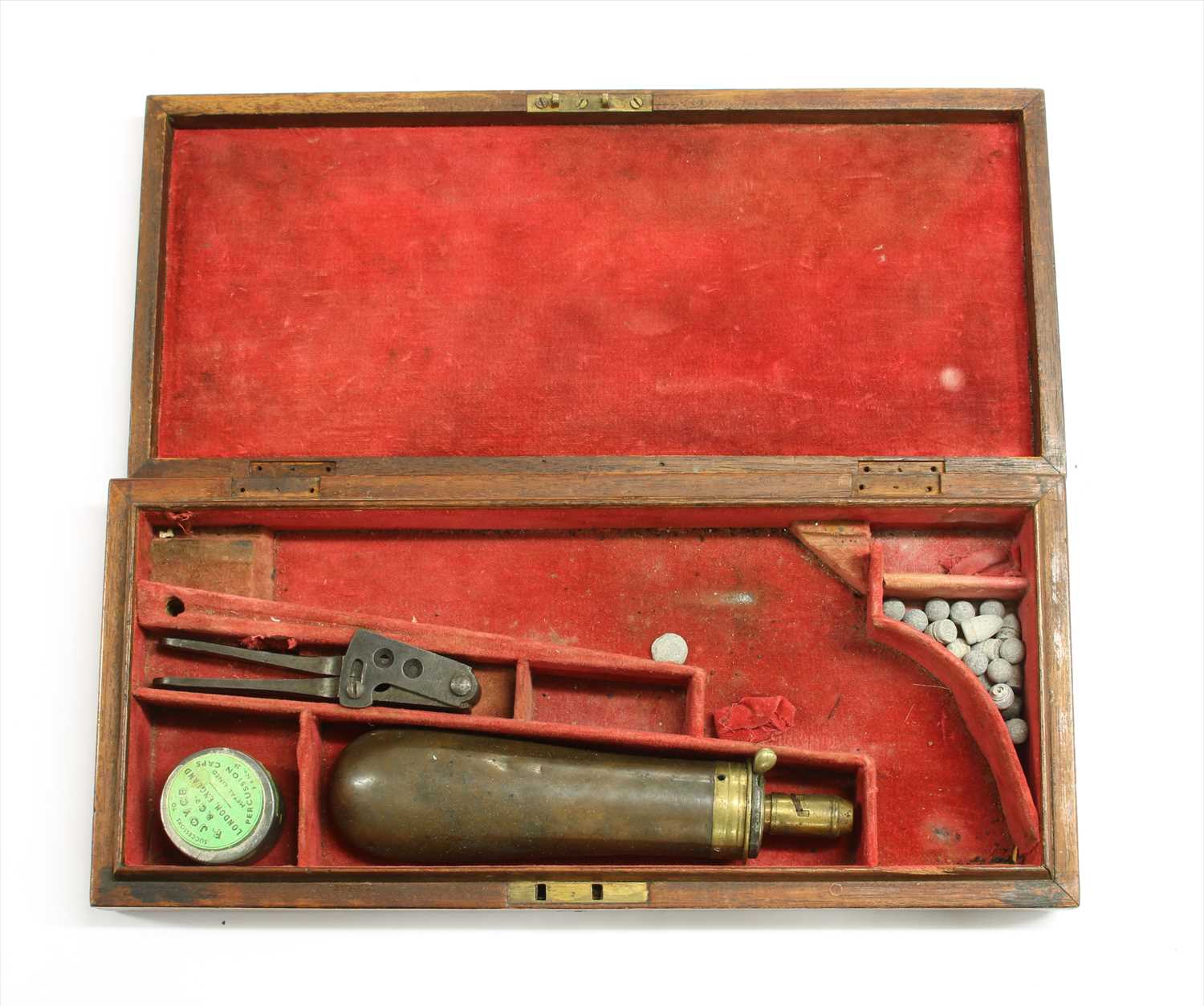 A mahogany revolver case, with a .36 calibre shot mould, sporting flask ...