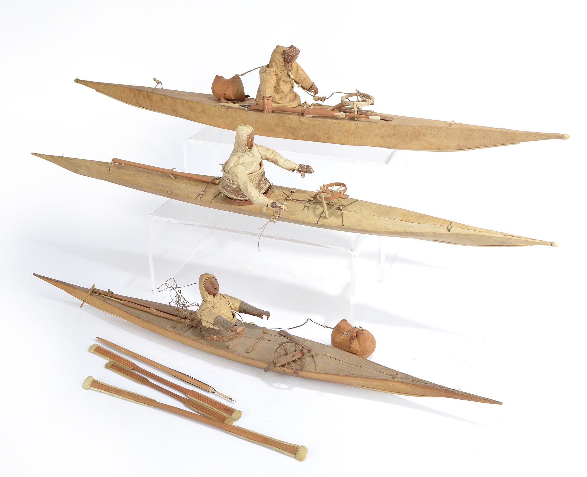 Three Inuit models of kayaks with figures Greenland wood, skin and bone ...