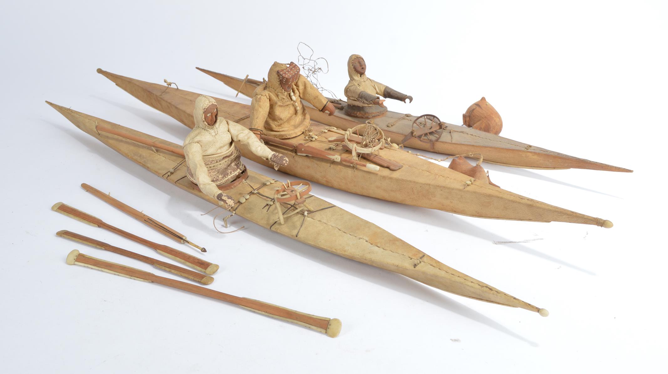 Three Inuit models of kayaks with figures Greenland wood, skin and bone ...