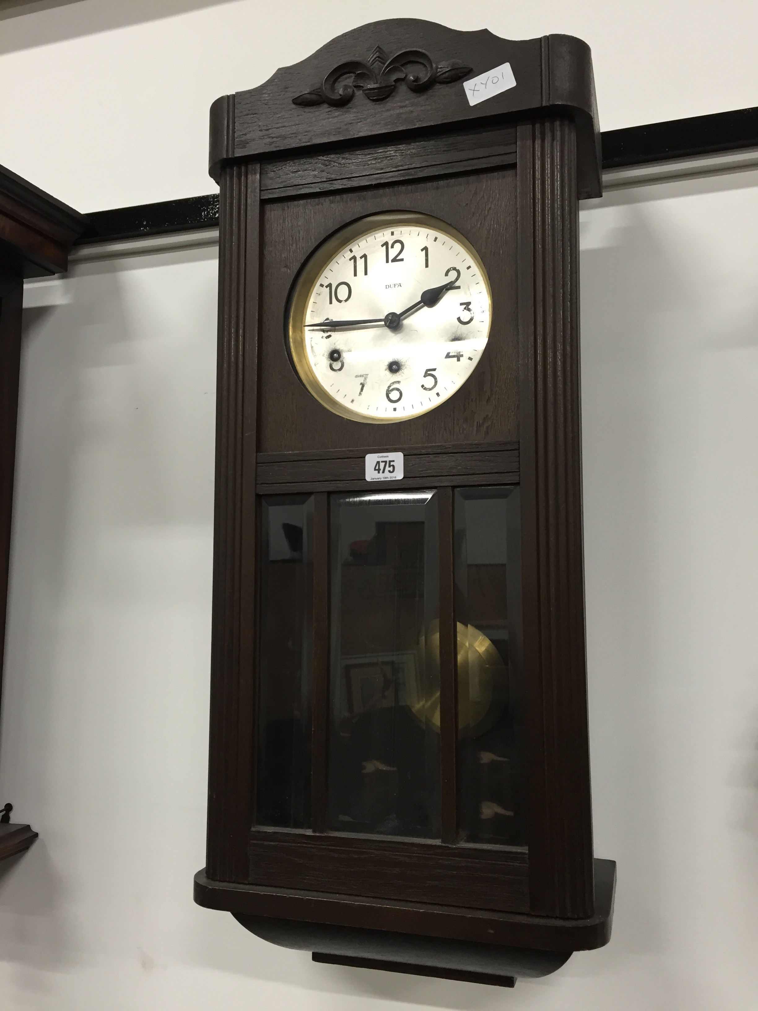 An early 20th century Dufa oak cased striking regulator wall clock.