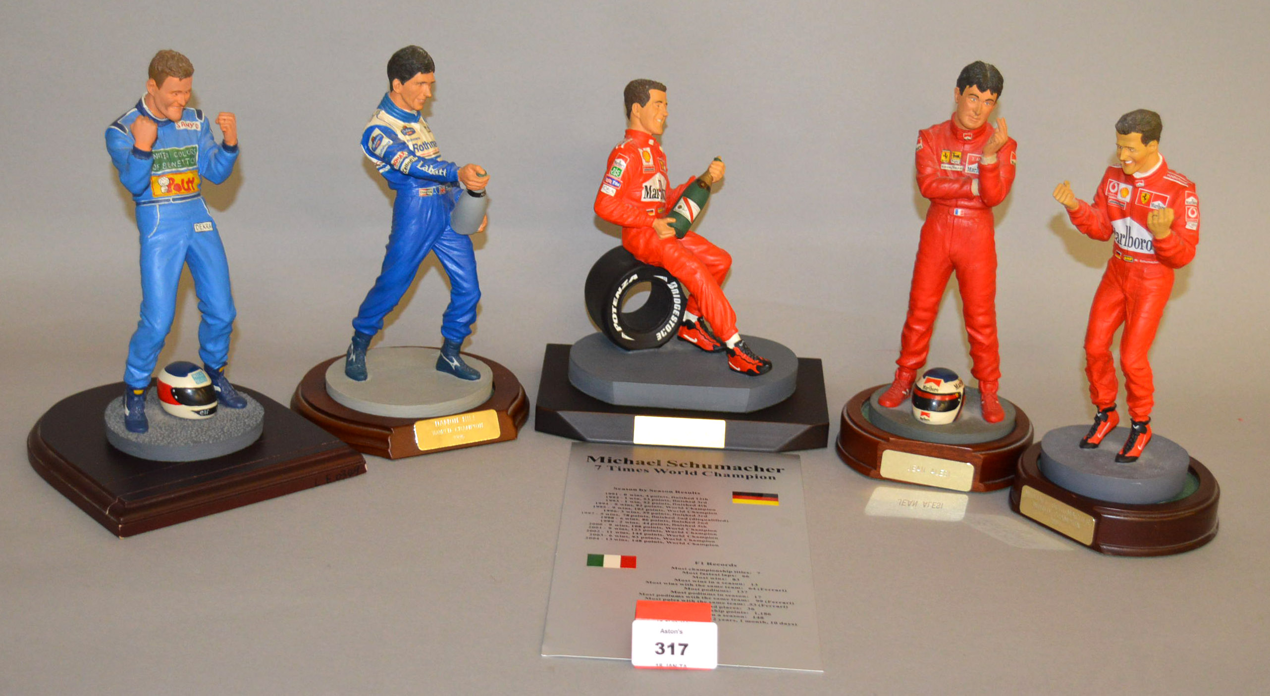 Five unboxed resin Racing Driver figurines including Jean Alesi and ...