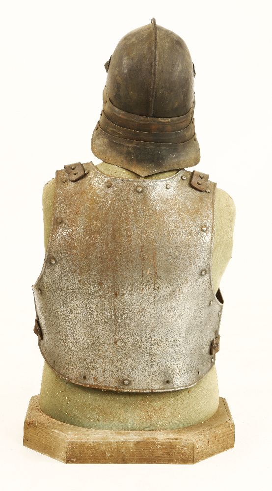 Cromwellian armour,a lobster tail helmet, with hinged face guard ...