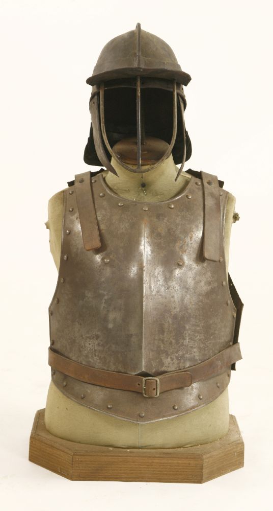 Cromwellian armour,a lobster tail helmet, with hinged face guard ...