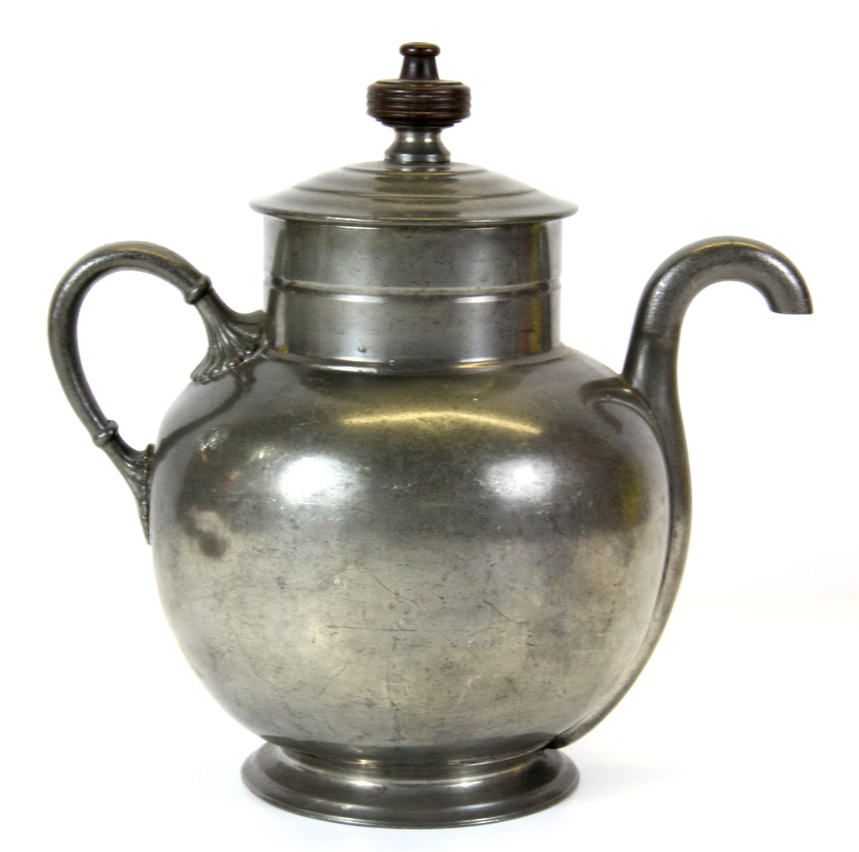 An interesting 19th Century 'self pouring' pewter tea pot, H. 19cm.