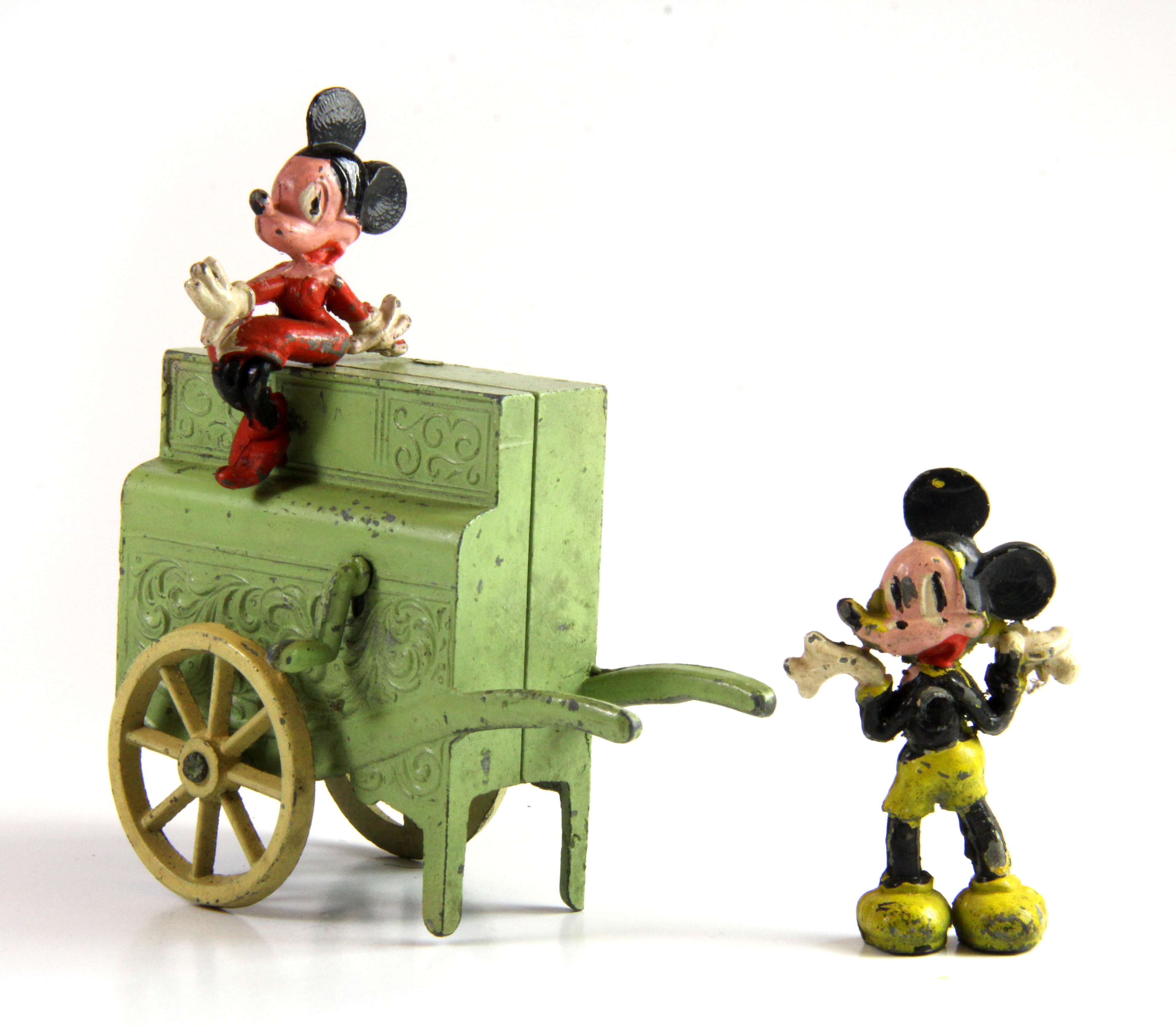 A small early cast metal Disney Mickey and Minnie Mouse barrel organ ...