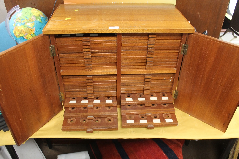 A HOME MADE COIN COLLECTORS CABINET
