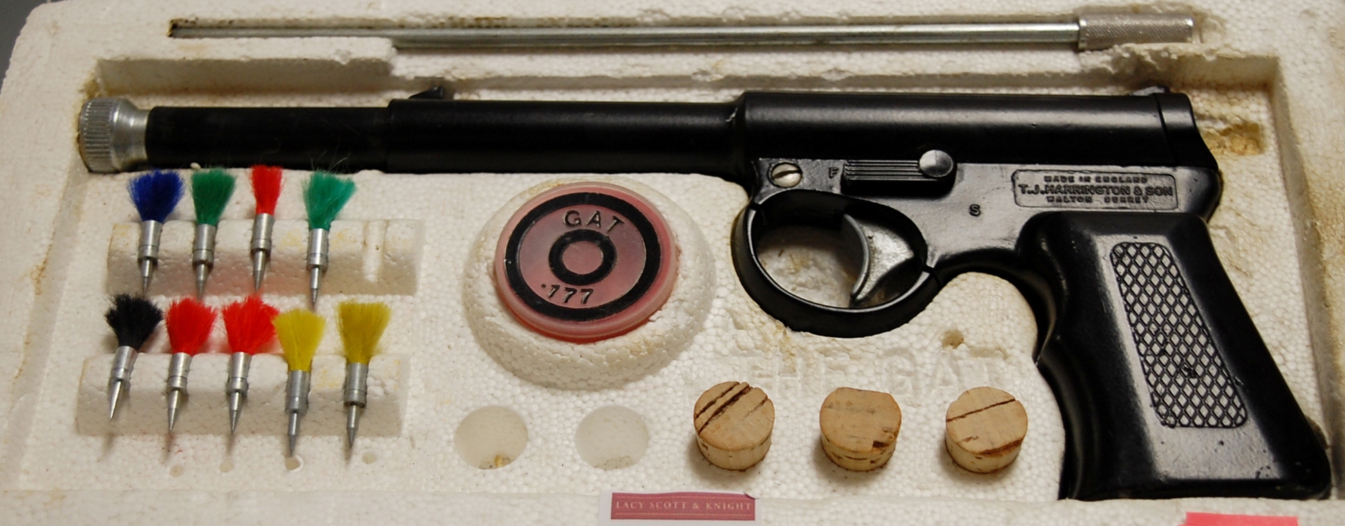 A gat gun and accessories by T J Harrington & Son, Walton, Surrey