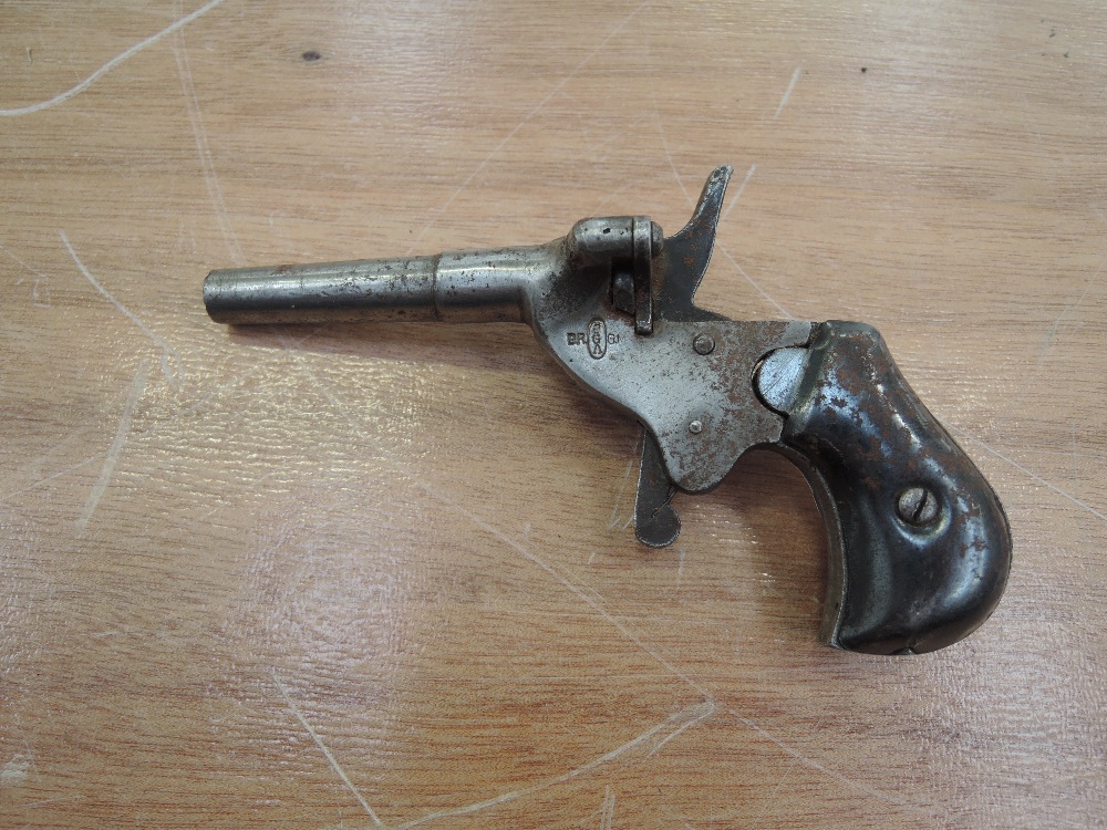 A vintage small calibre blank fire pistol, DR. JGA. GM marks rimfire