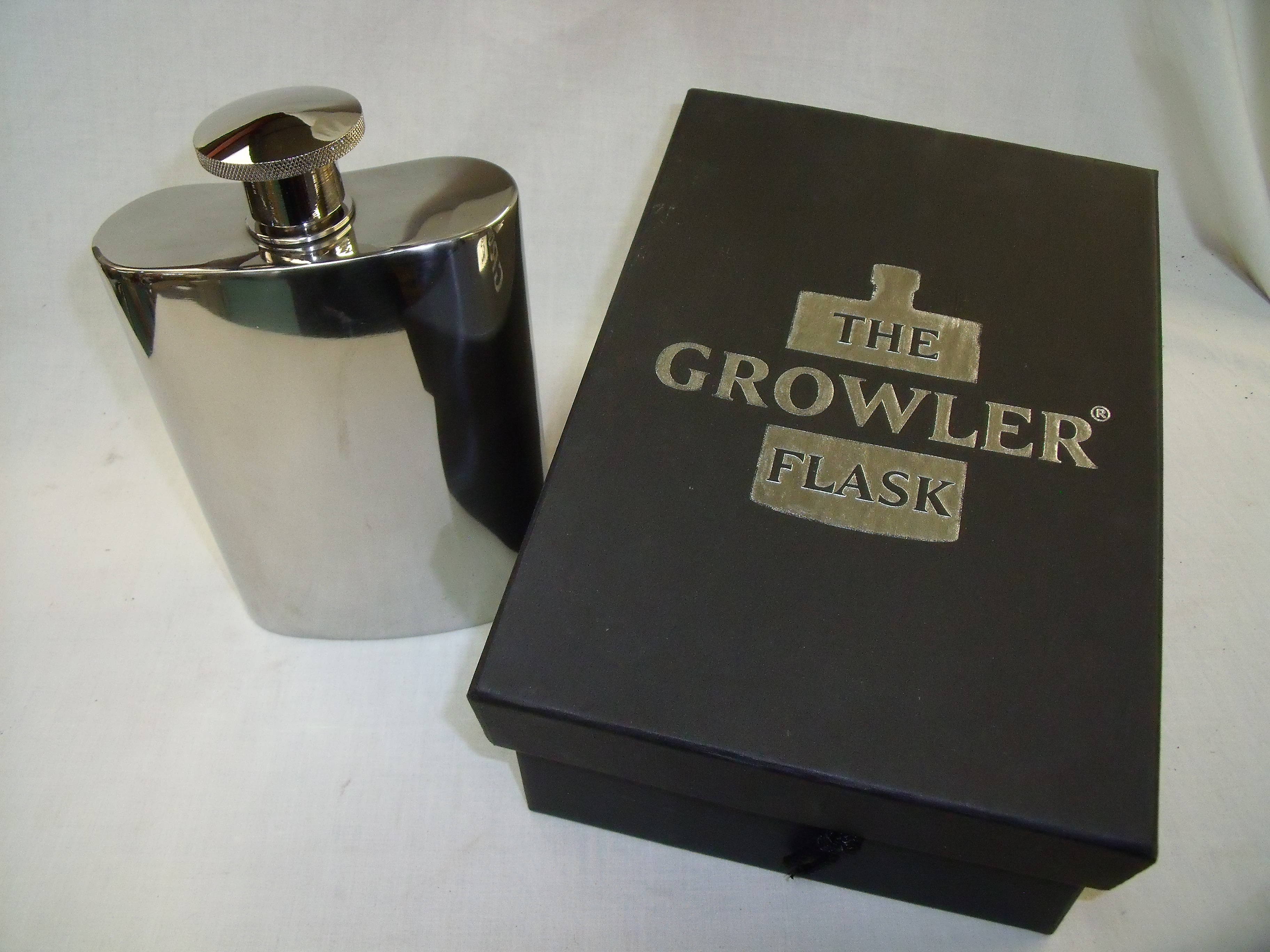 Boxed as new 'The Growler flask' giant hip flask