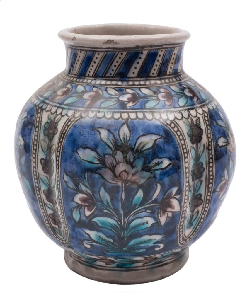 A group of four pieces of Turkish Kutahya pottery: including two long ...