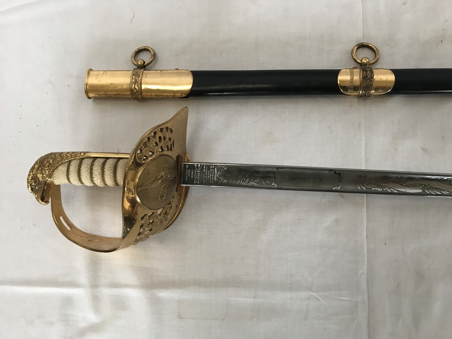 An Elizabeth II Royal Airforce officers sword with eagle pommel, Queen ...