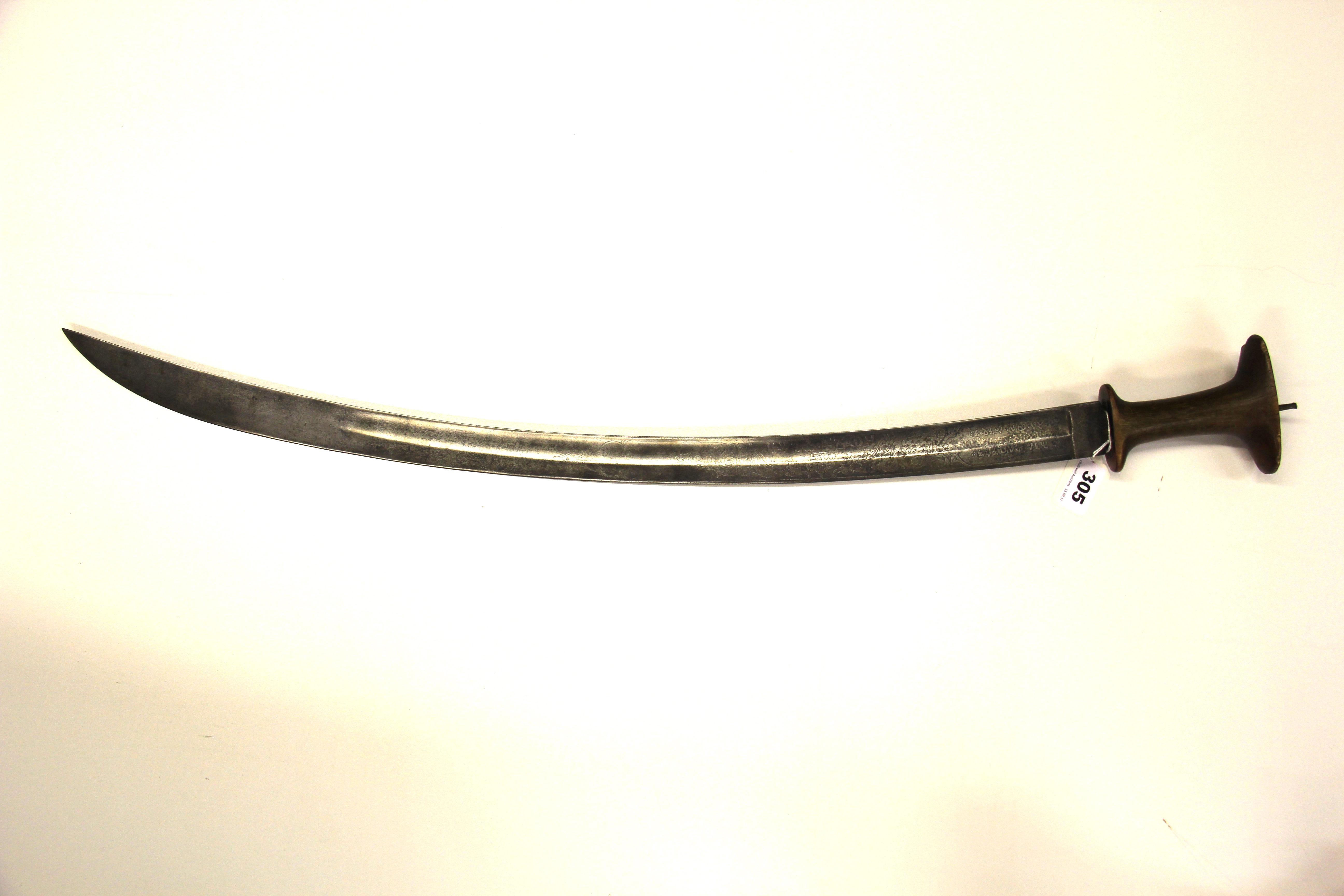 An early 20th century Ethiopian sword (shotel) with rhino horn hilt ...