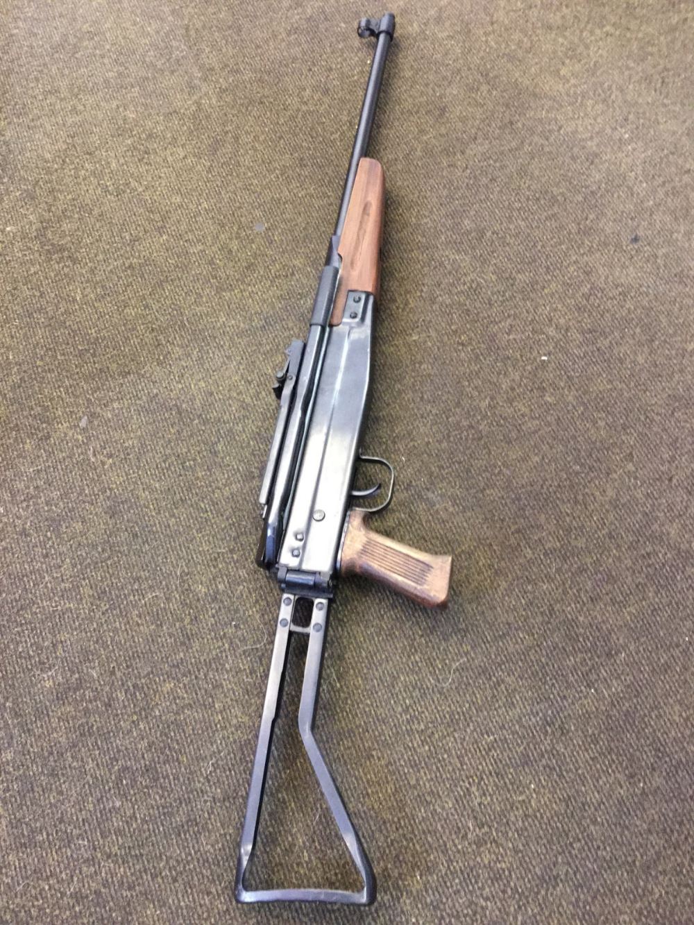 A Chinese made air rifle with side lever action. (35in)