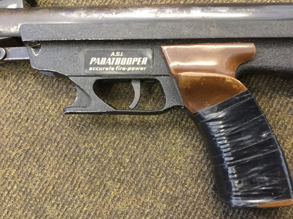 An ASI Paratrooper .22 air gun (37in); and a Crossman Steve Harper ...