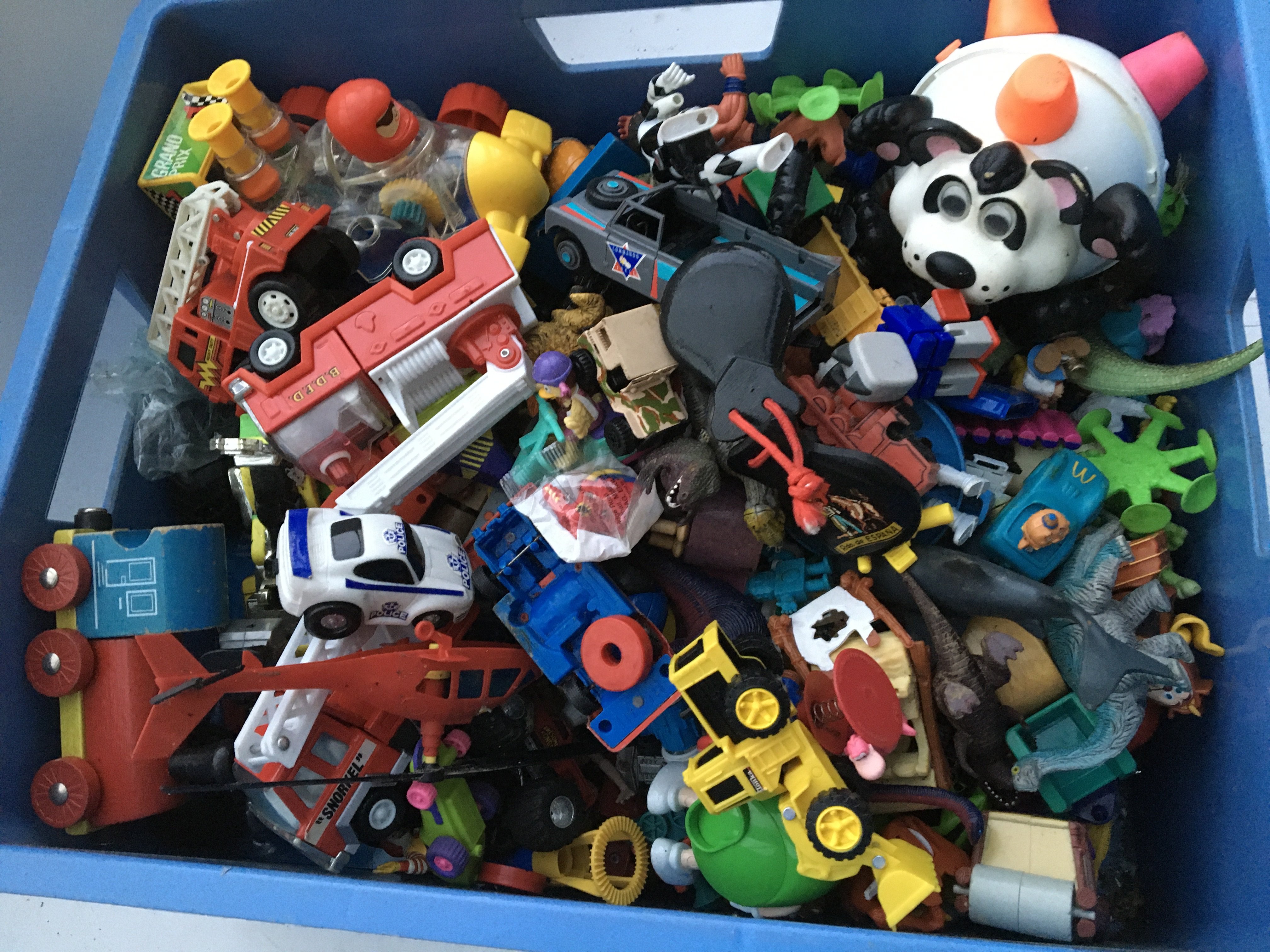 A box full of random toys including, Meccano, diecast, figures etc