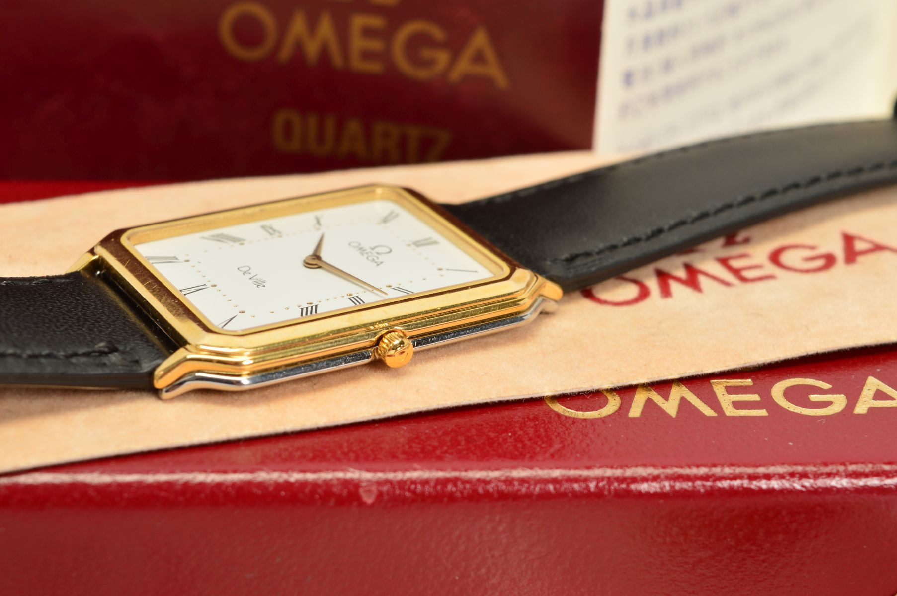 A 1980'S OMEGA DE VILLE QUARTZ WRISTWATCH, gold plated rectangular case ...
