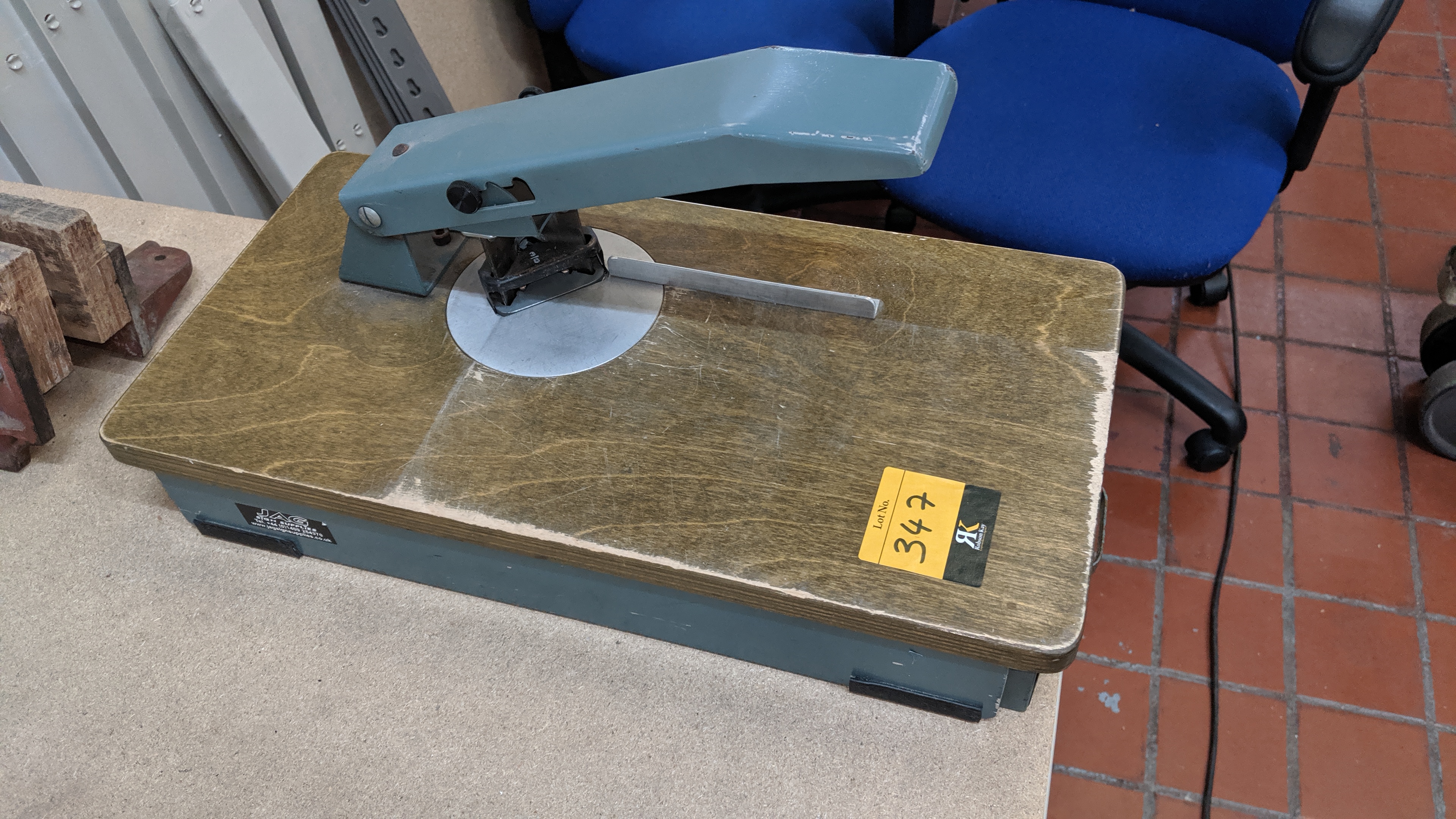 Benchtop cutter which appears to be for cutting rounded corners ...