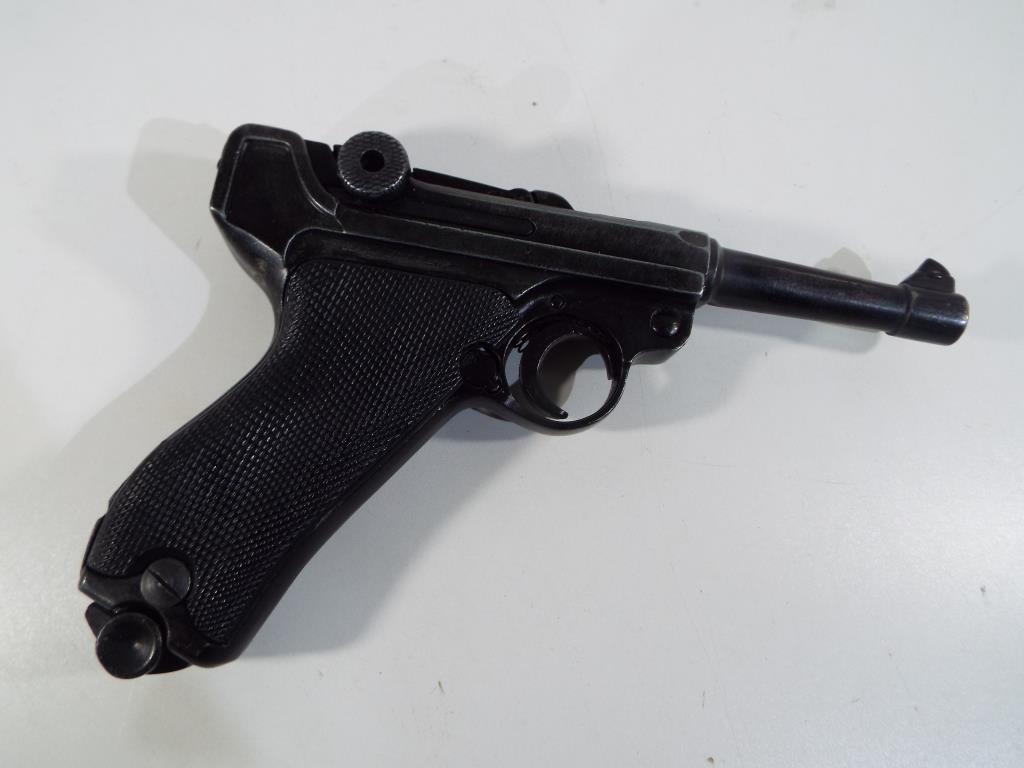 A replica P-08 9mm parabellum (Luger) pistol with fully functional ...