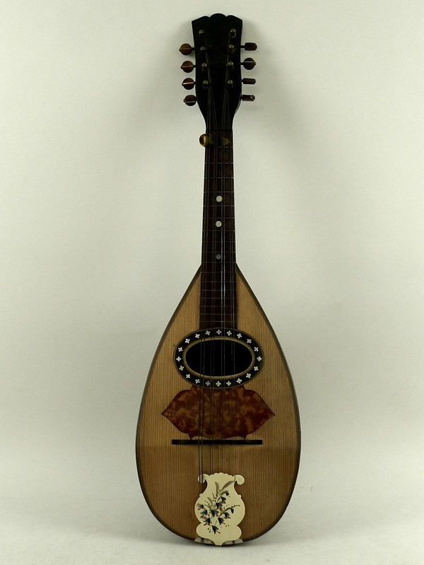 An eight string mandolin, early 20th century, with mother of pearl ...