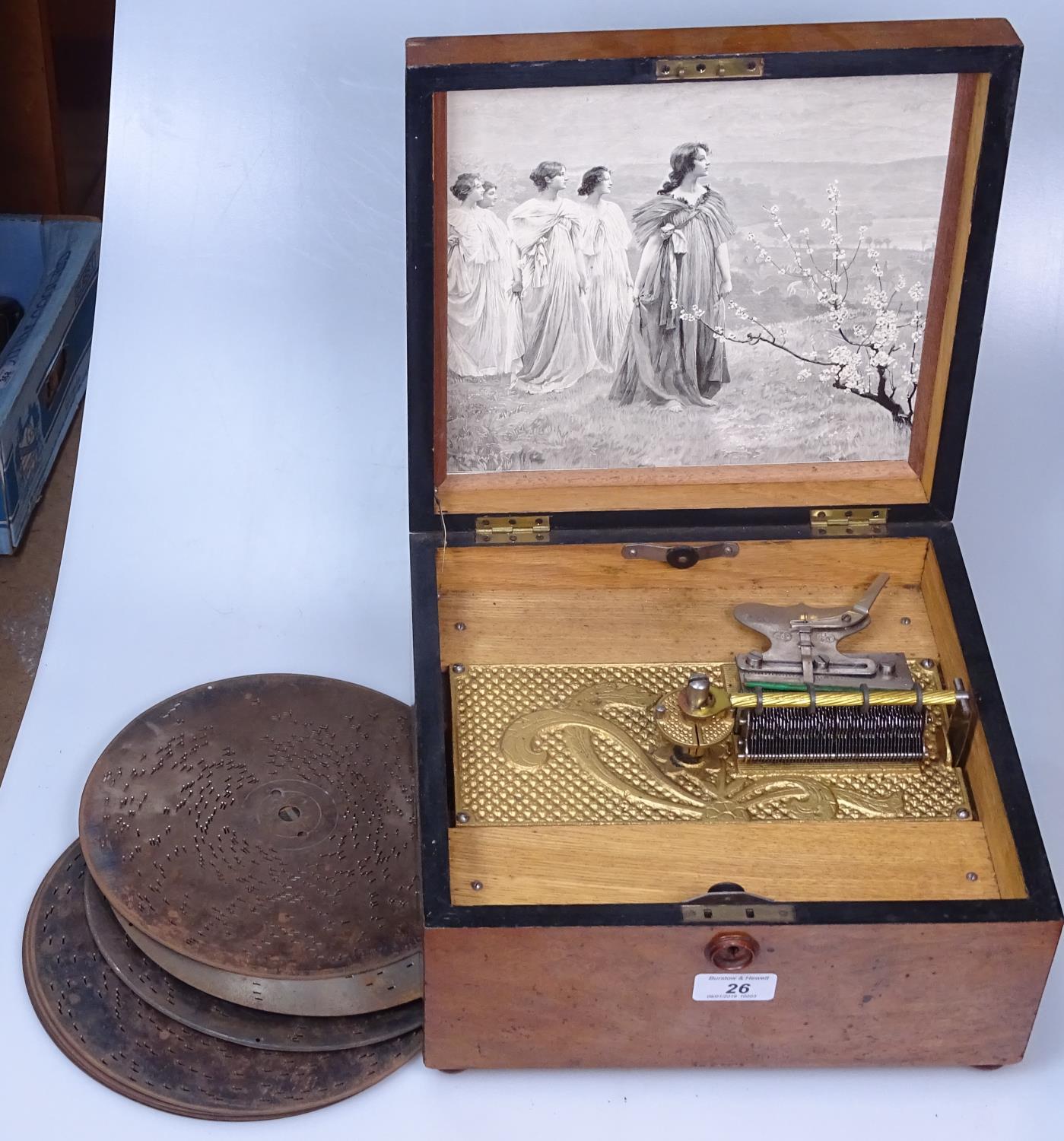 An Antique polyphon with a selection of 9"" discs