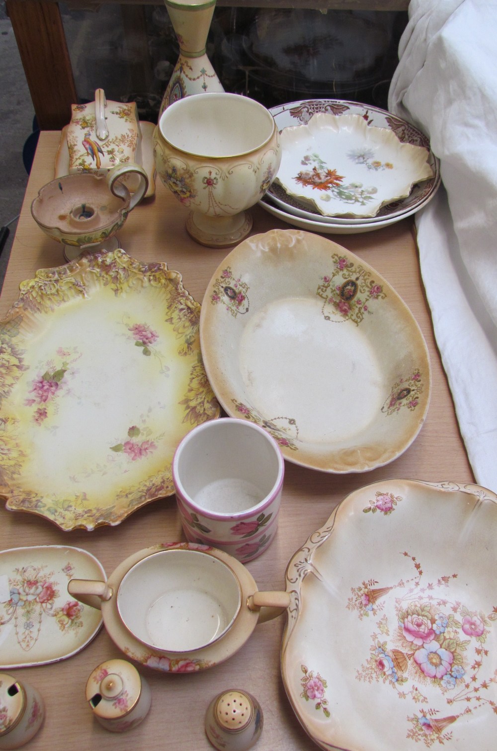 A collection of Crown Devon pottery including plates, bowls, butter ...