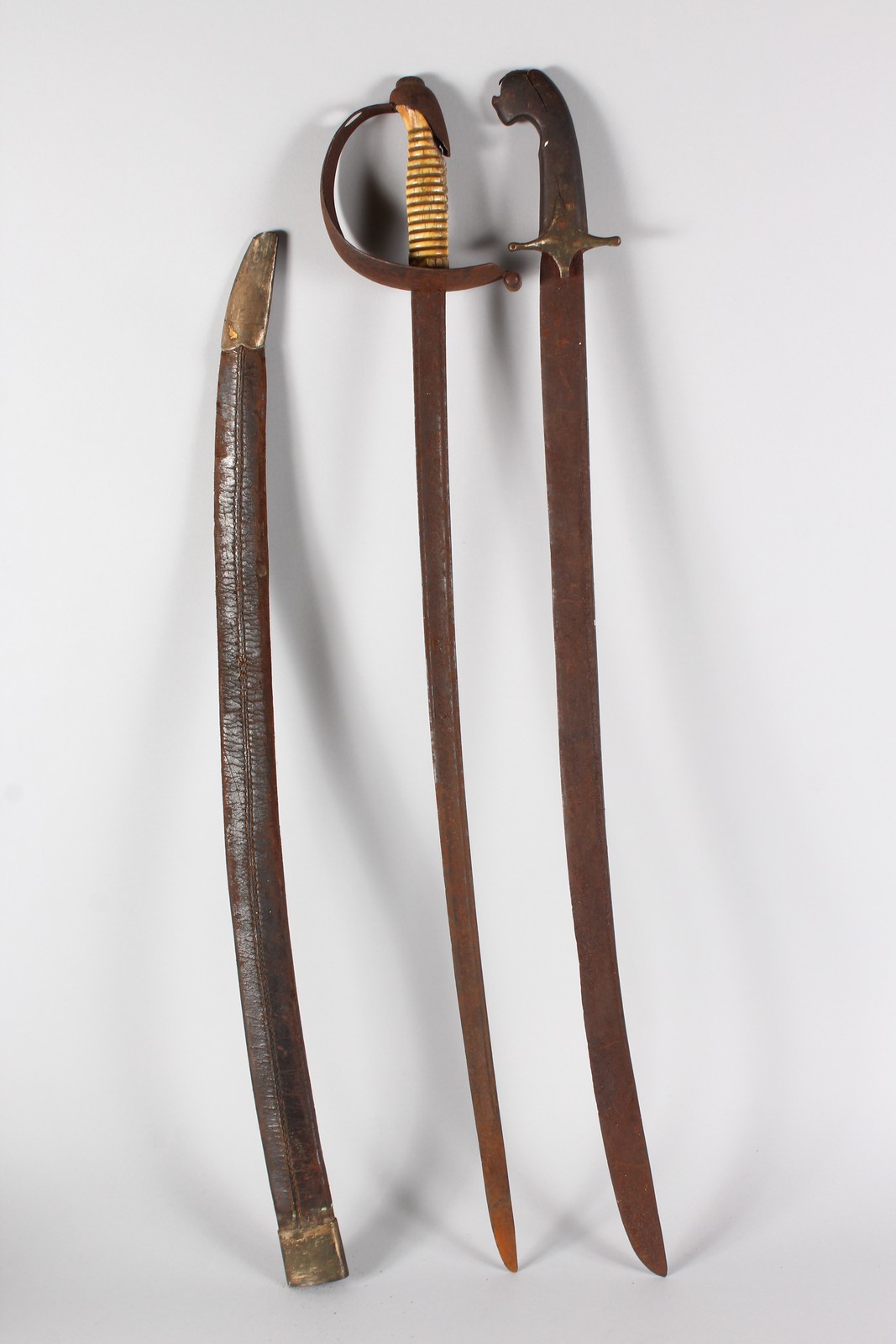 A RELIC CAVALRY SWORD, curved blade, plain iron hilt with ivory grip ...